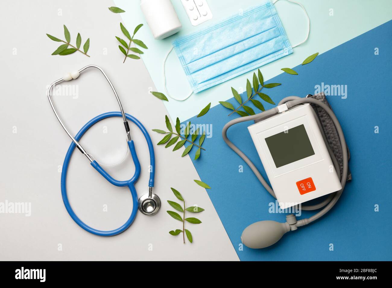 First aid kit on color background Stock Photo - Alamy