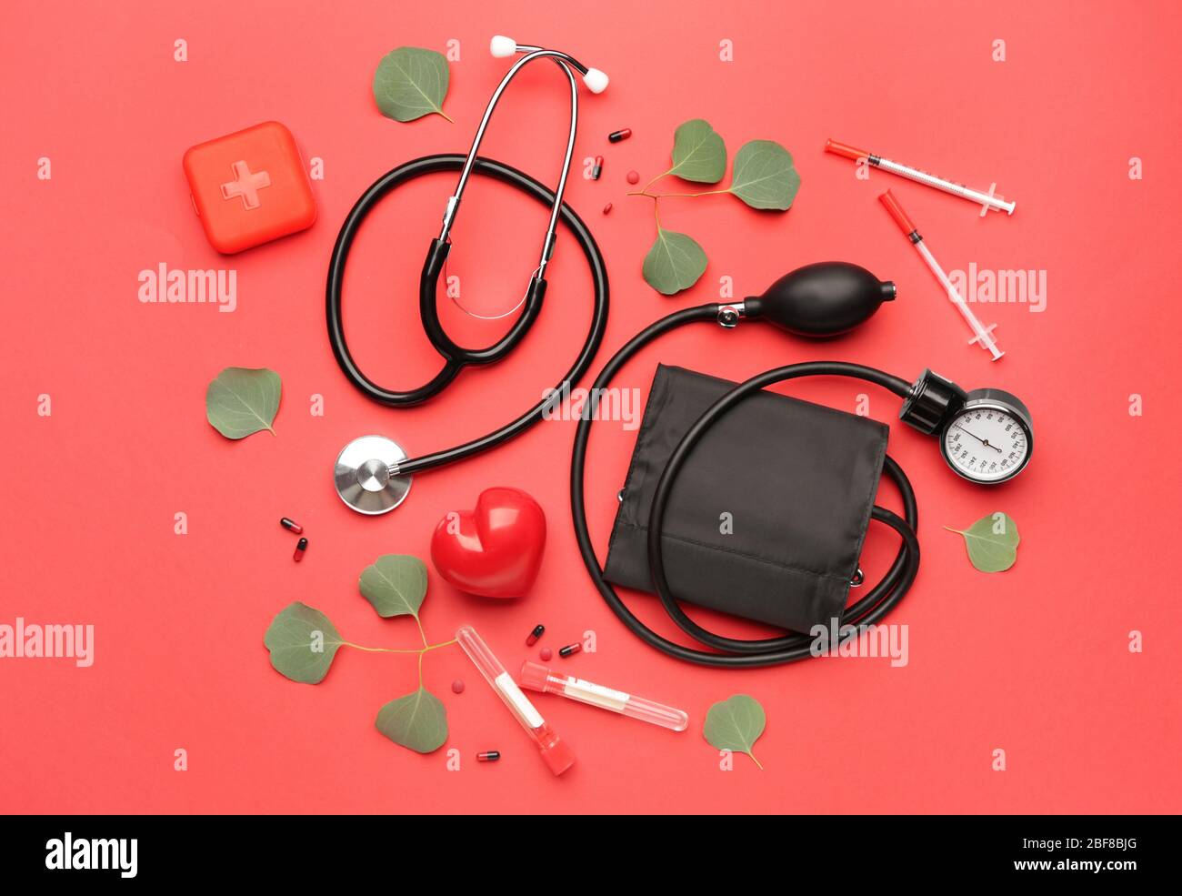 First aid kit on color background Stock Photo - Alamy