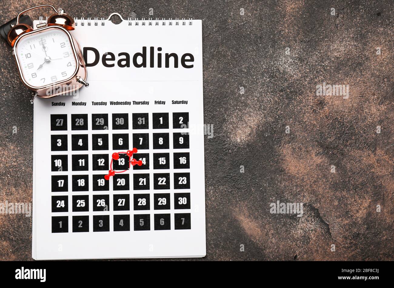 Calendar with alarm clock and text DEADLINE on dark background Stock ...