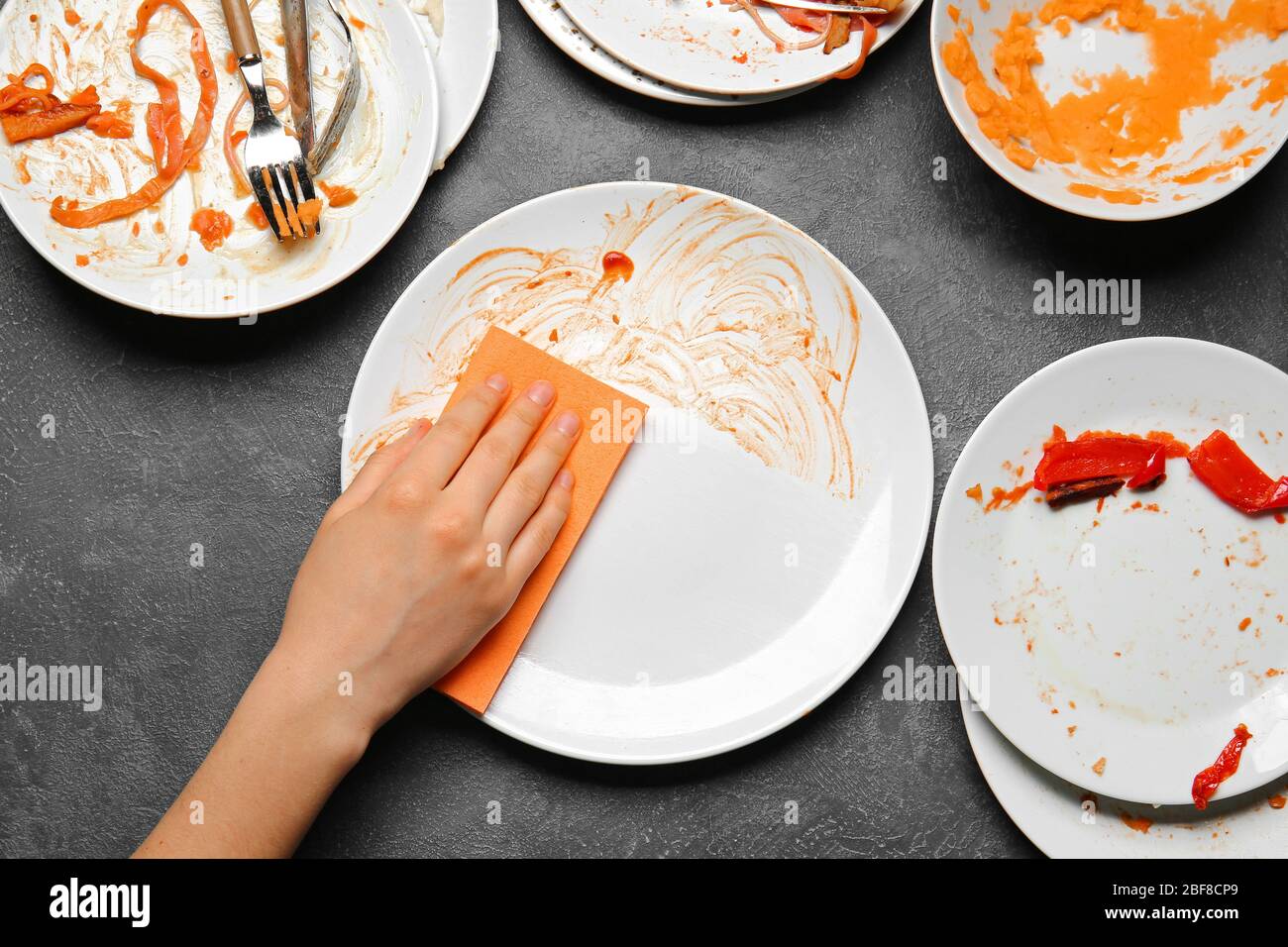 Woman smeared plate hi-res stock photography and images - Alamy