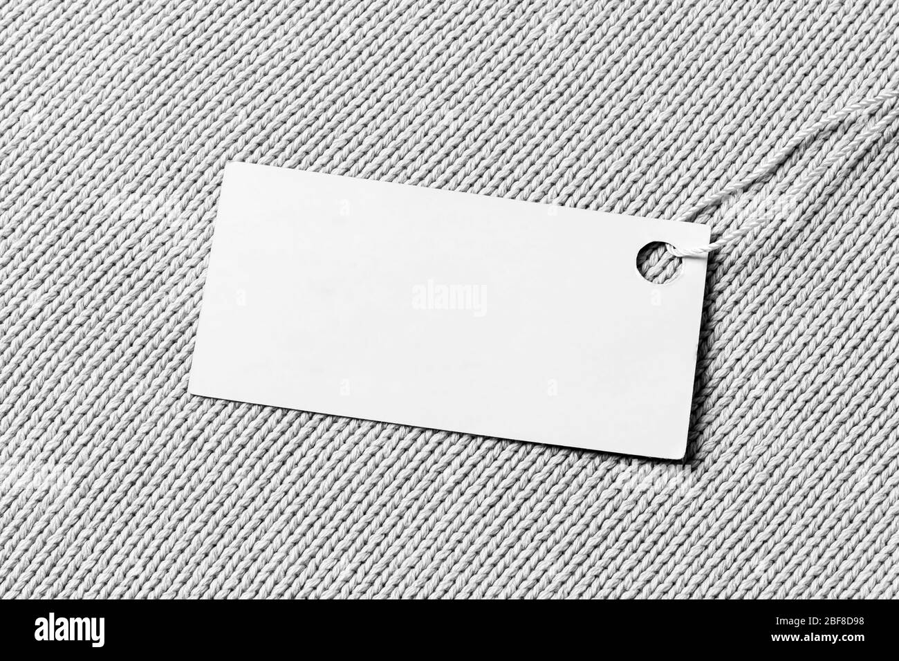 White label on a woolen fabric. Abstract background for design. Art ...