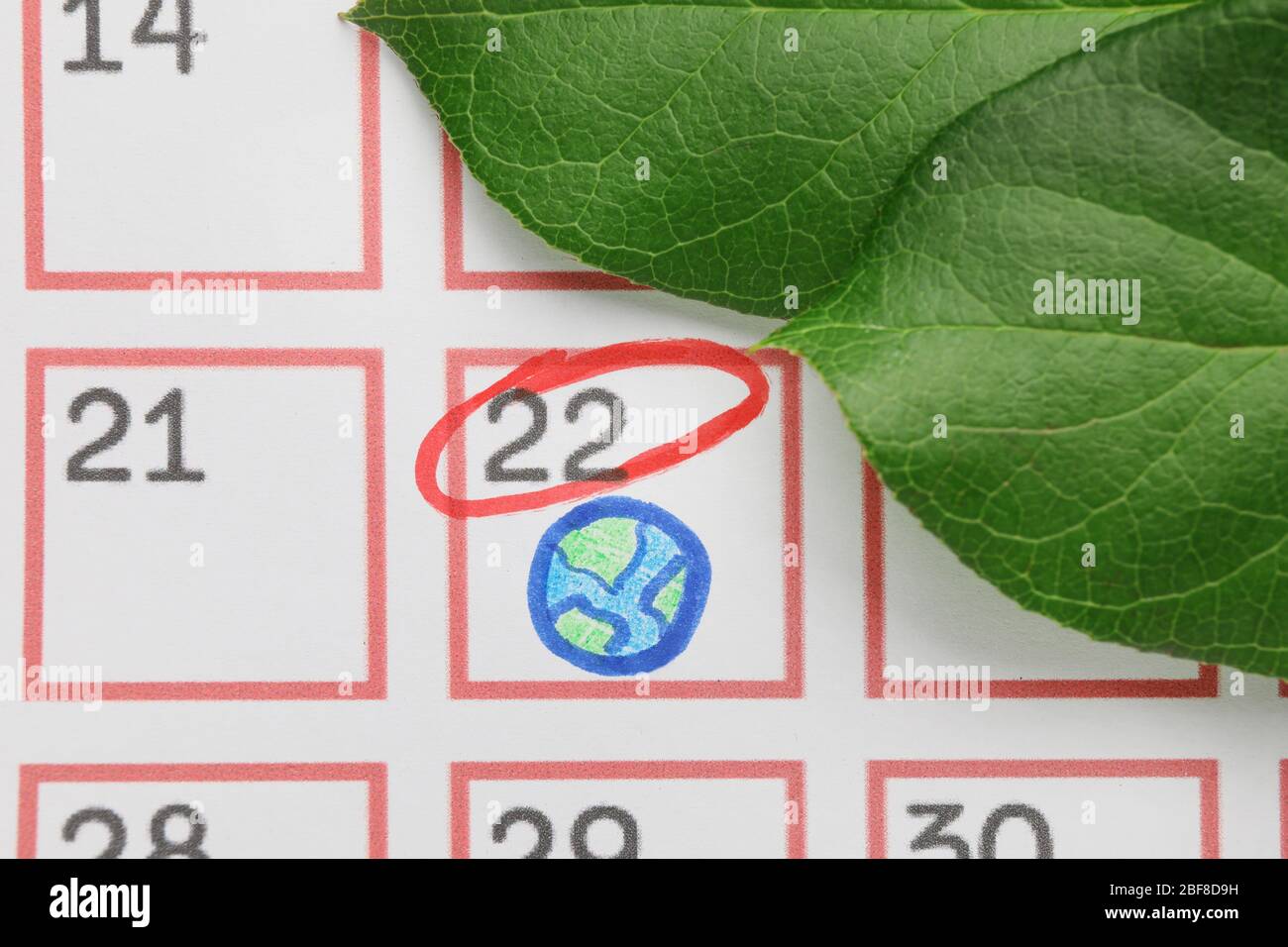 Calendar with marked date of Earth Day, closeup Stock Photo - Alamy