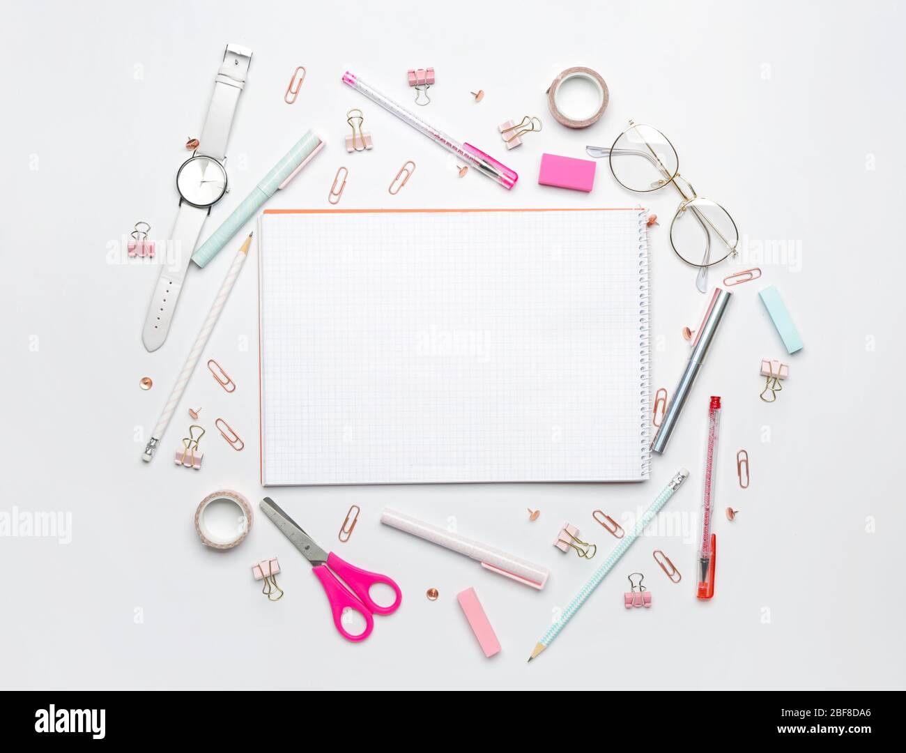 Notebook with school supplies on white background Stock Photo - Alamy