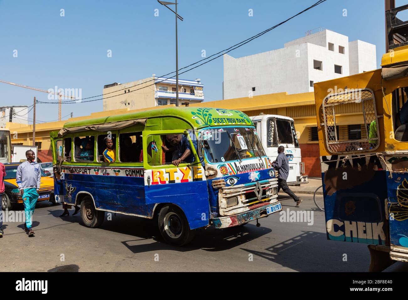DAKAR, SENEGAL - NOVEMBER 11, 2019: People working and traffic at ...