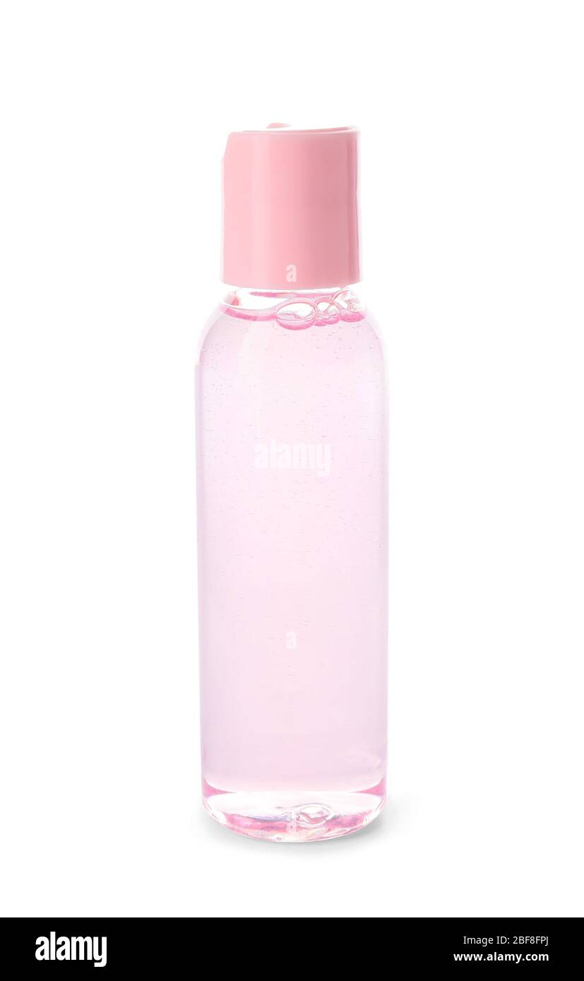 Cosmetic product in bottle on white background Stock Photo - Alamy