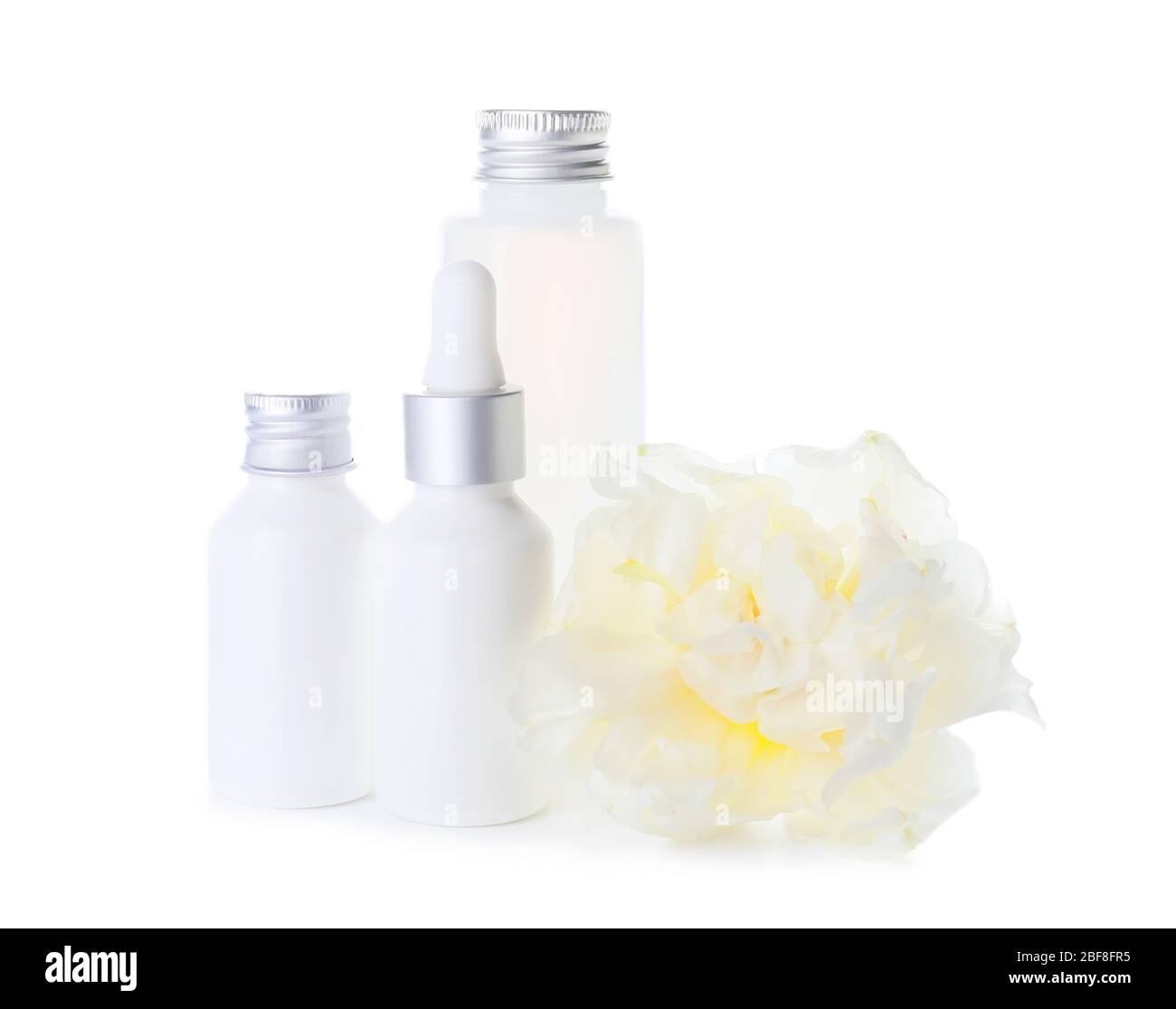 Different cosmetic products in bottles on white background Stock Photo ...
