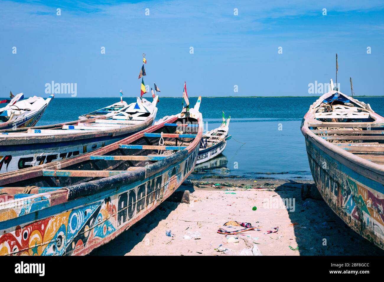 Traditional painted wooden fishing boat in Djiffer, Senegal. West ...