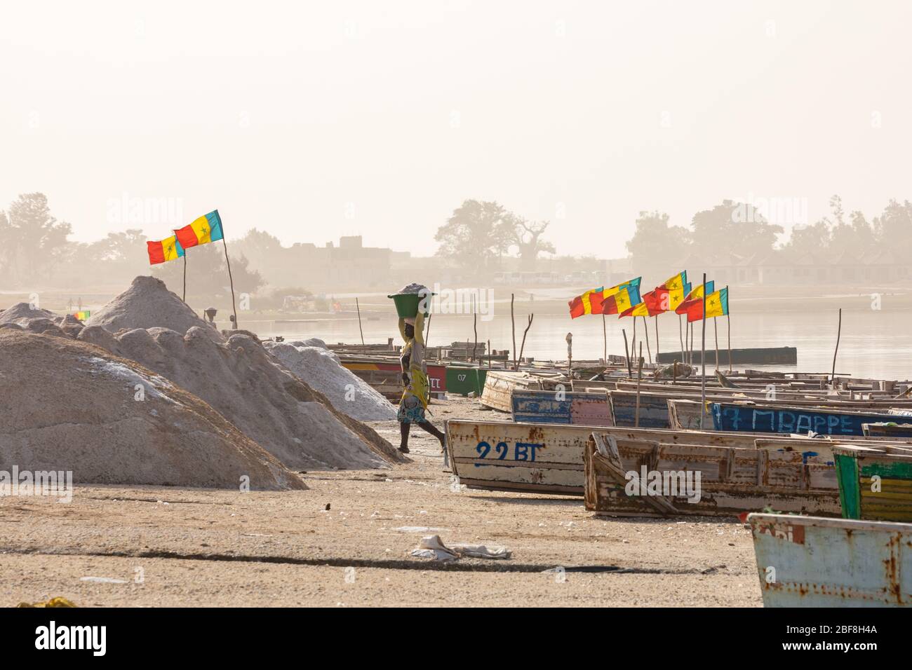 LAC ROSE, SENEGAL - NOVEMBER 13, 2019: Boats at Lac Rose or Retba Lake ...