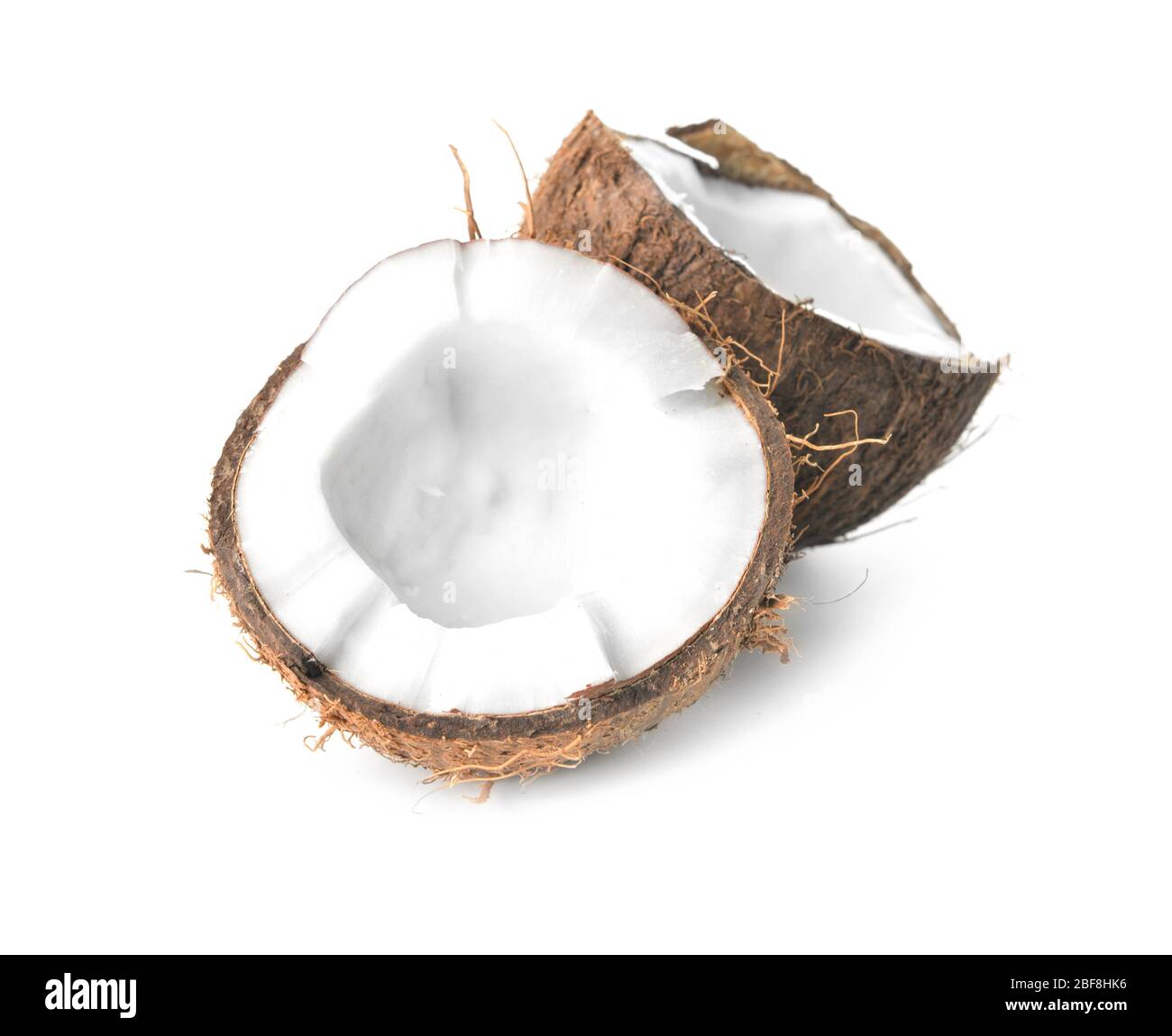 Ripe coconuts on white background Stock Photo - Alamy