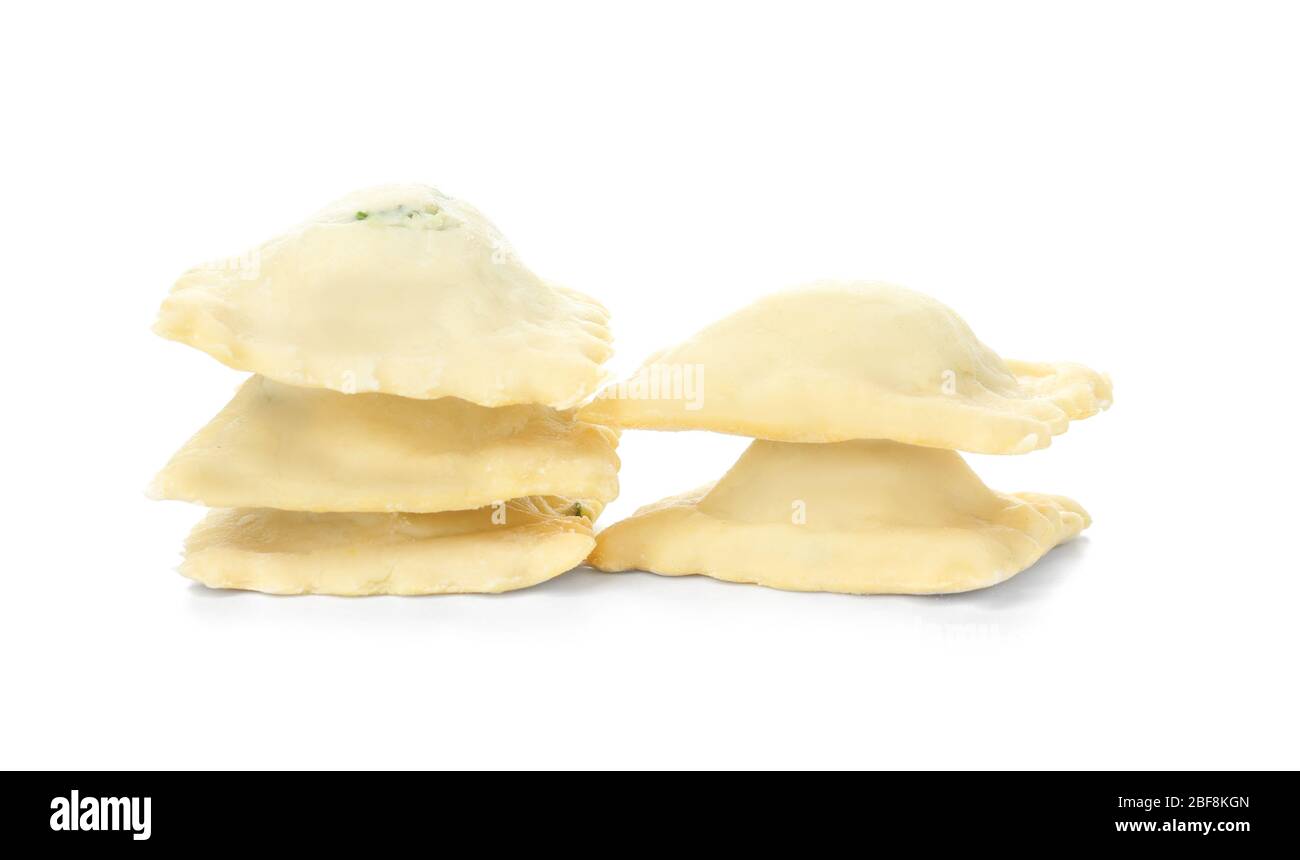 Raw ravioli on white background Stock Photo - Alamy