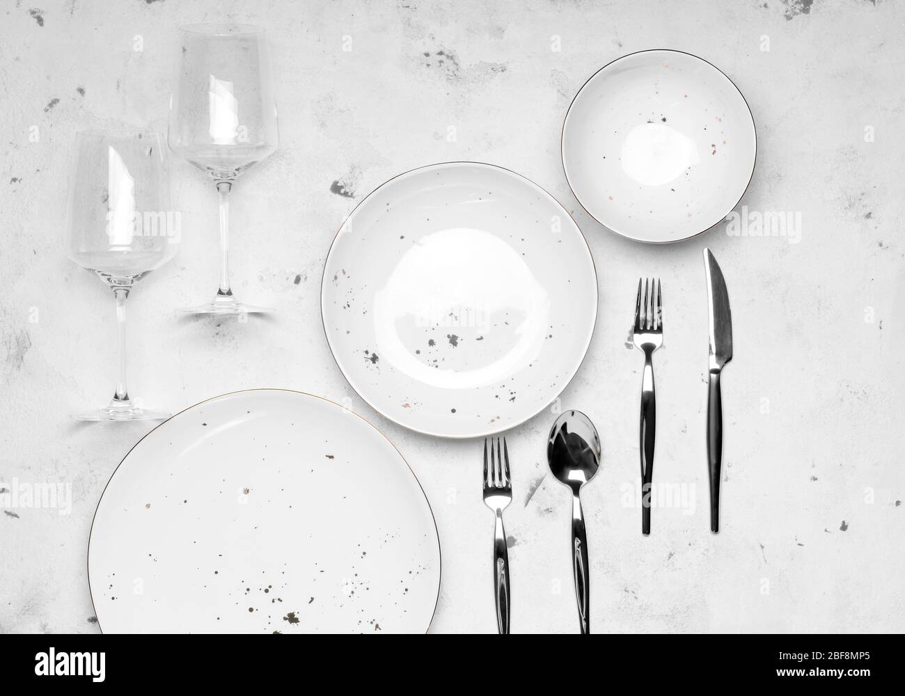 Simple table setting on white background Stock Photo - Alamy