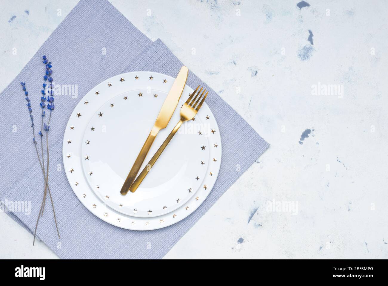 Simple table setting on white background Stock Photo - Alamy