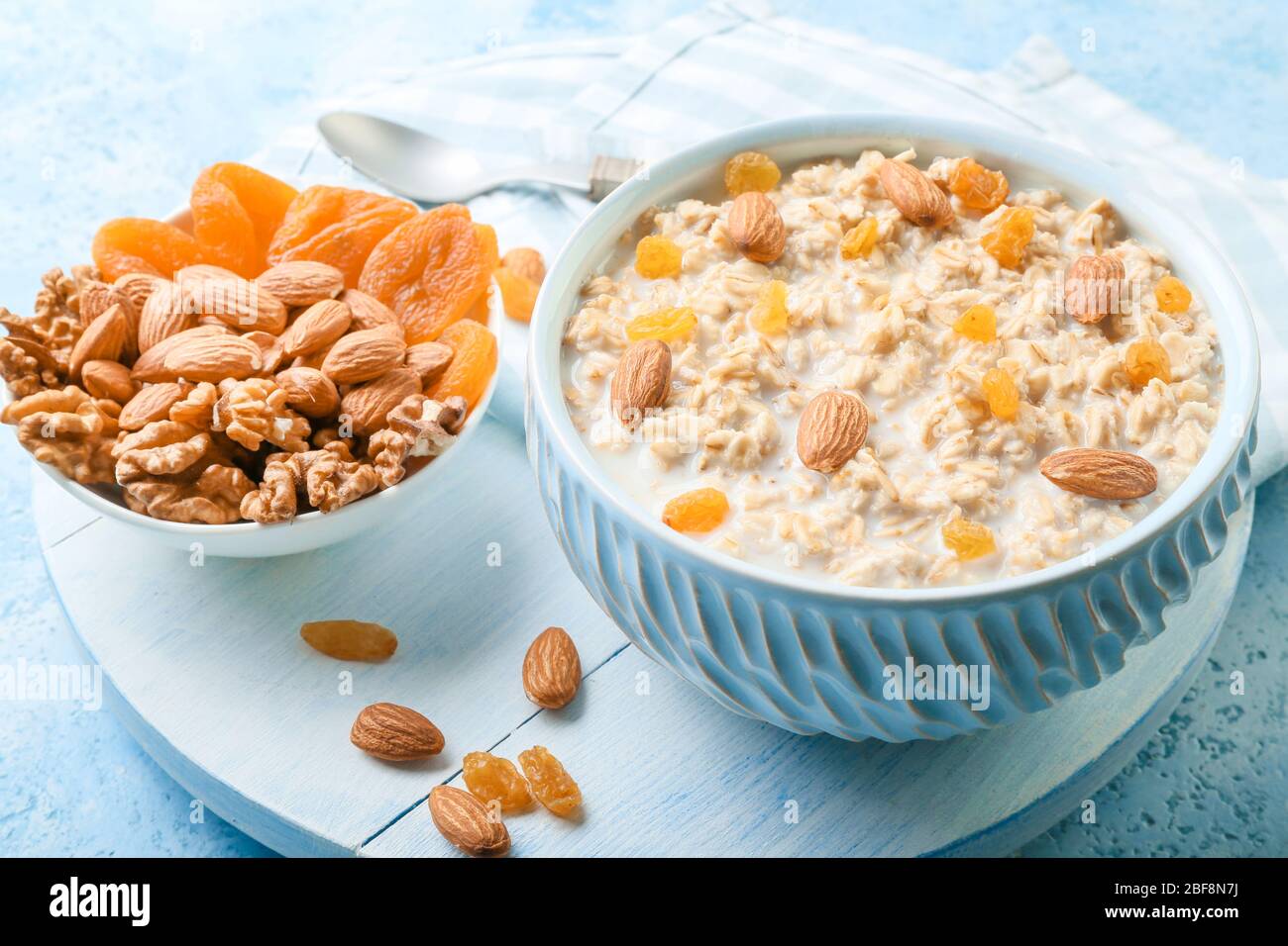 Bowls tasty oatmeal nuts hi-res stock photography and images - Alamy