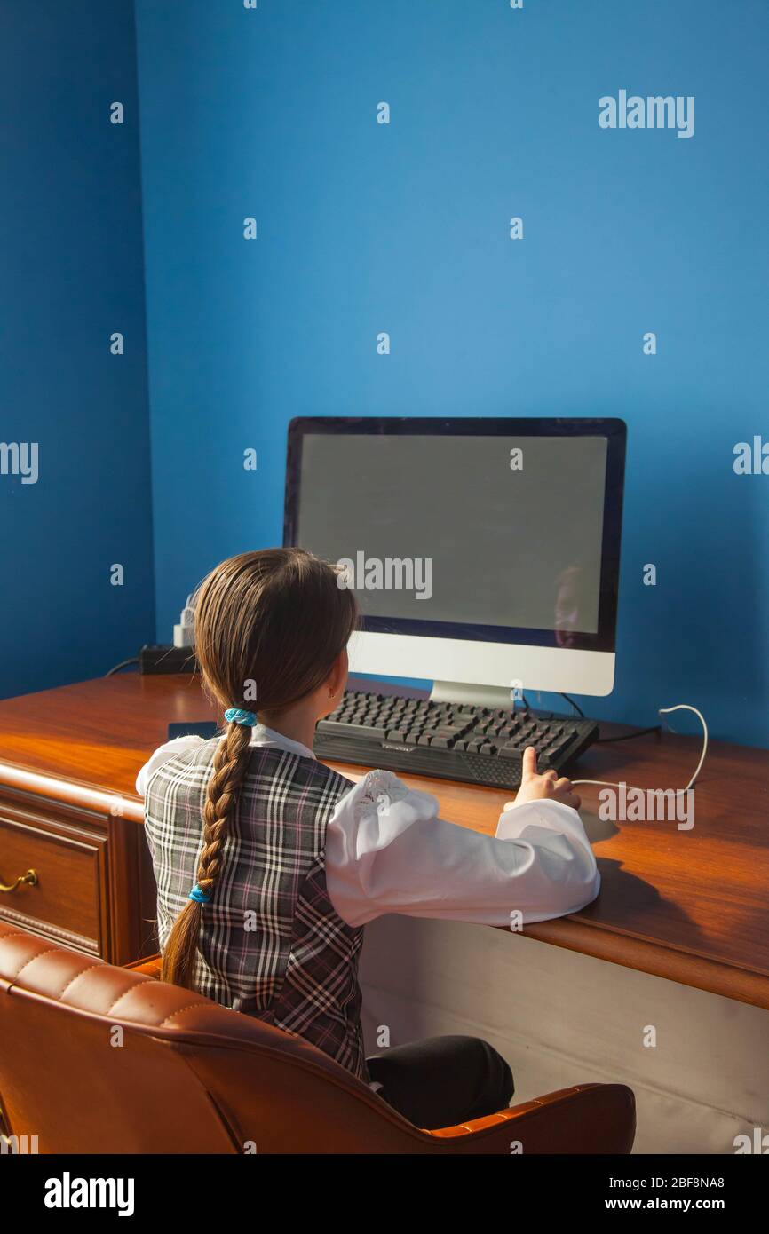 School girl working computer hi-res stock photography and images - Alamy