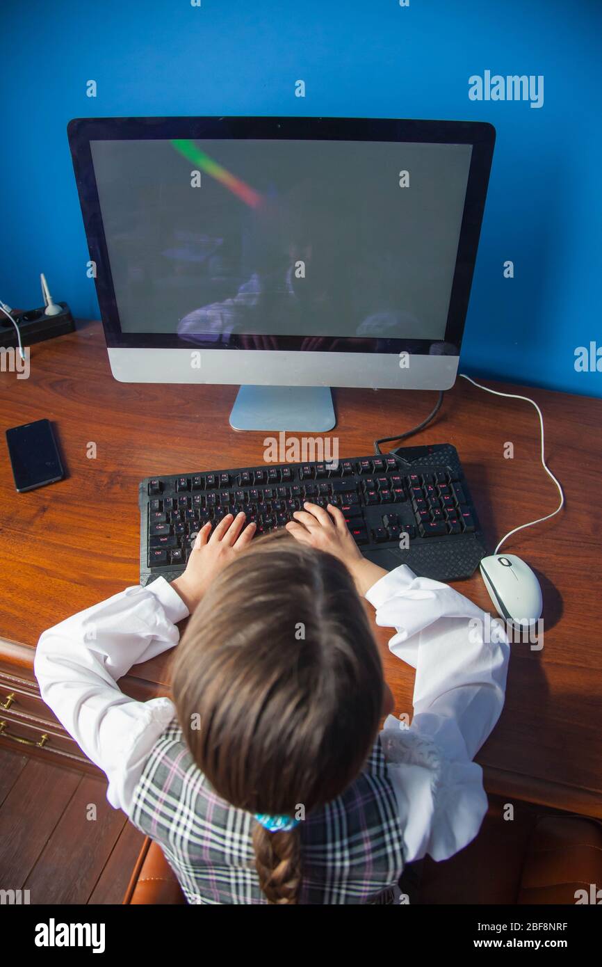 School girl working computer hi-res stock photography and images - Alamy
