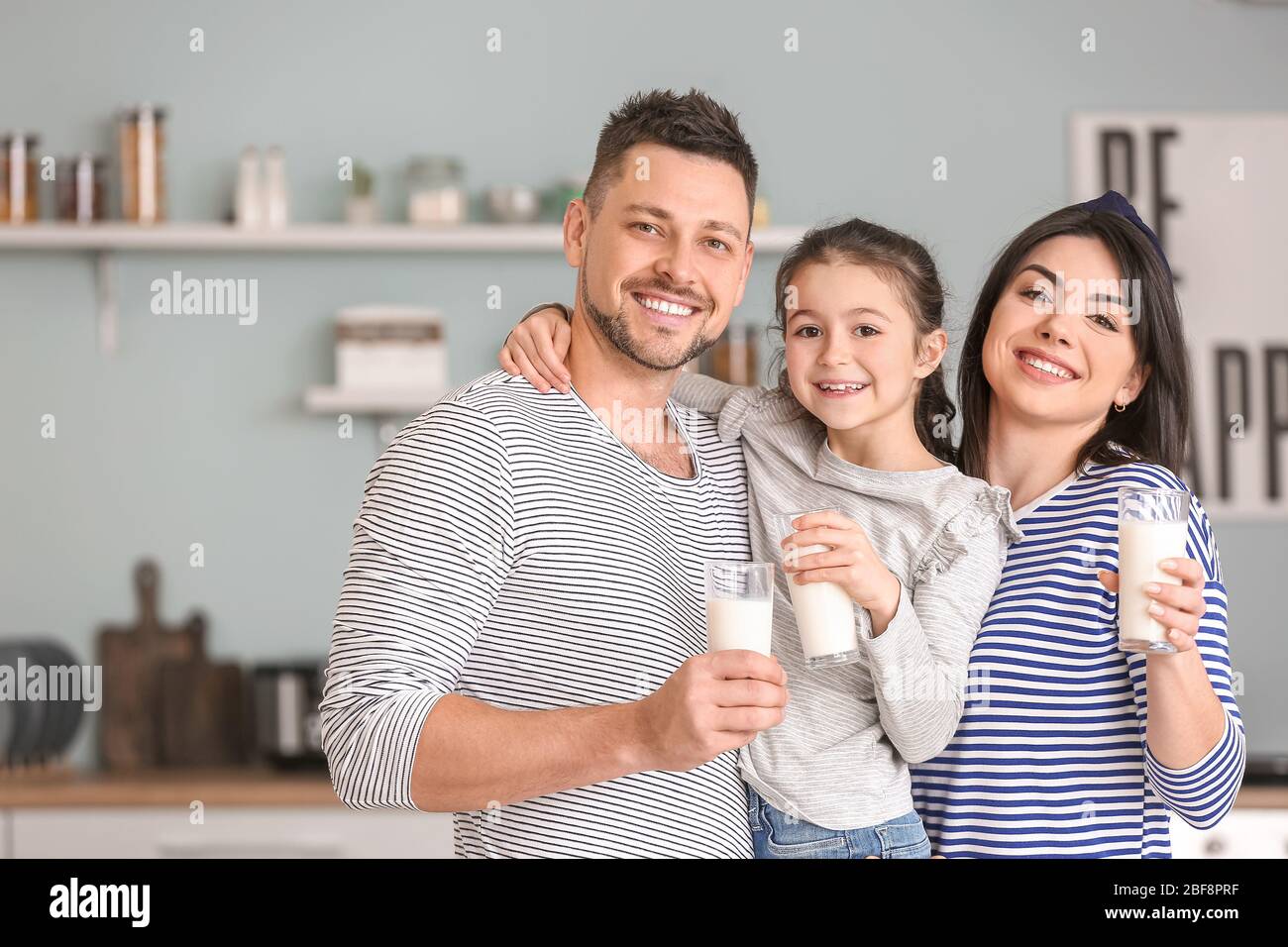 Family drinking milk hi-res stock photography and images - Alamy