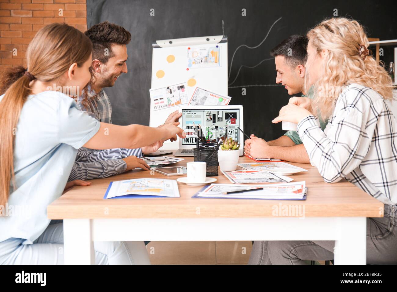 Young people attending course in interior design Stock Photo - Alamy