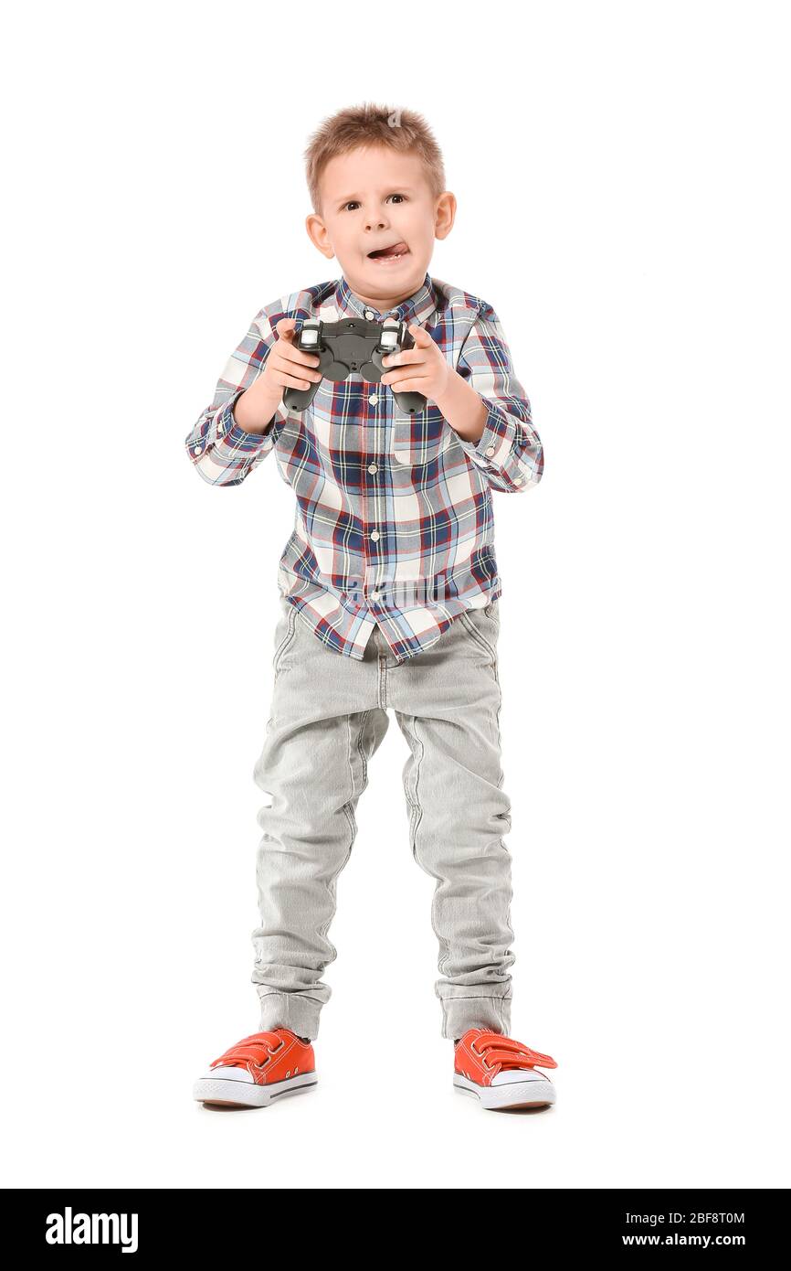 Cute little boy playing video games on white background Stock Photo - Alamy