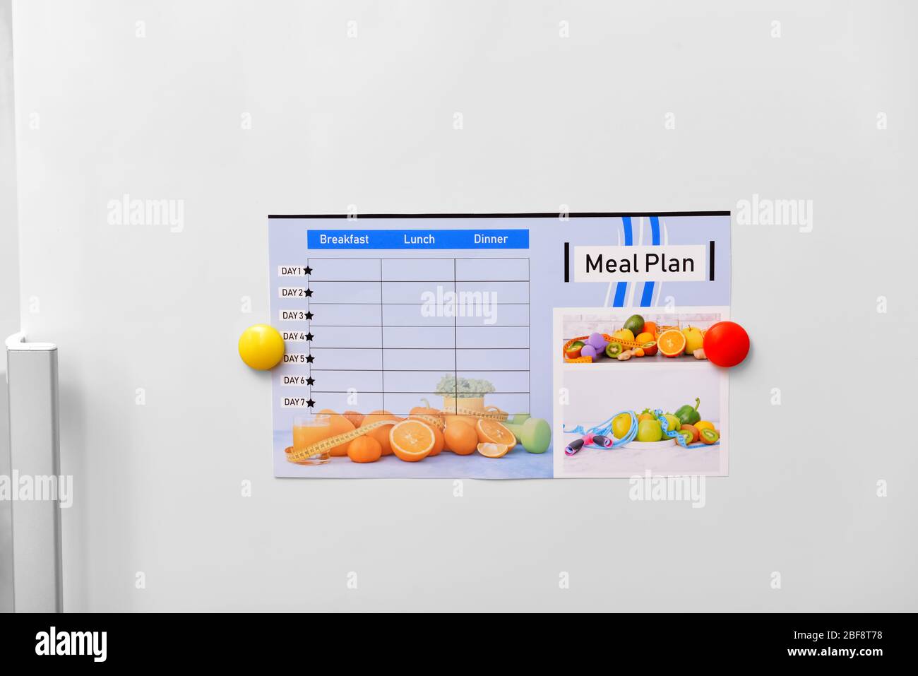 Empty meal plan on fridge in kitchen Stock Photo - Alamy