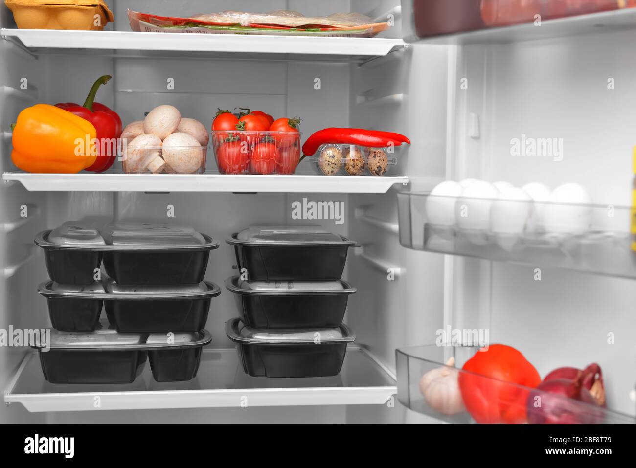 Food in containers in fridge hi-res stock photography and images - Alamy