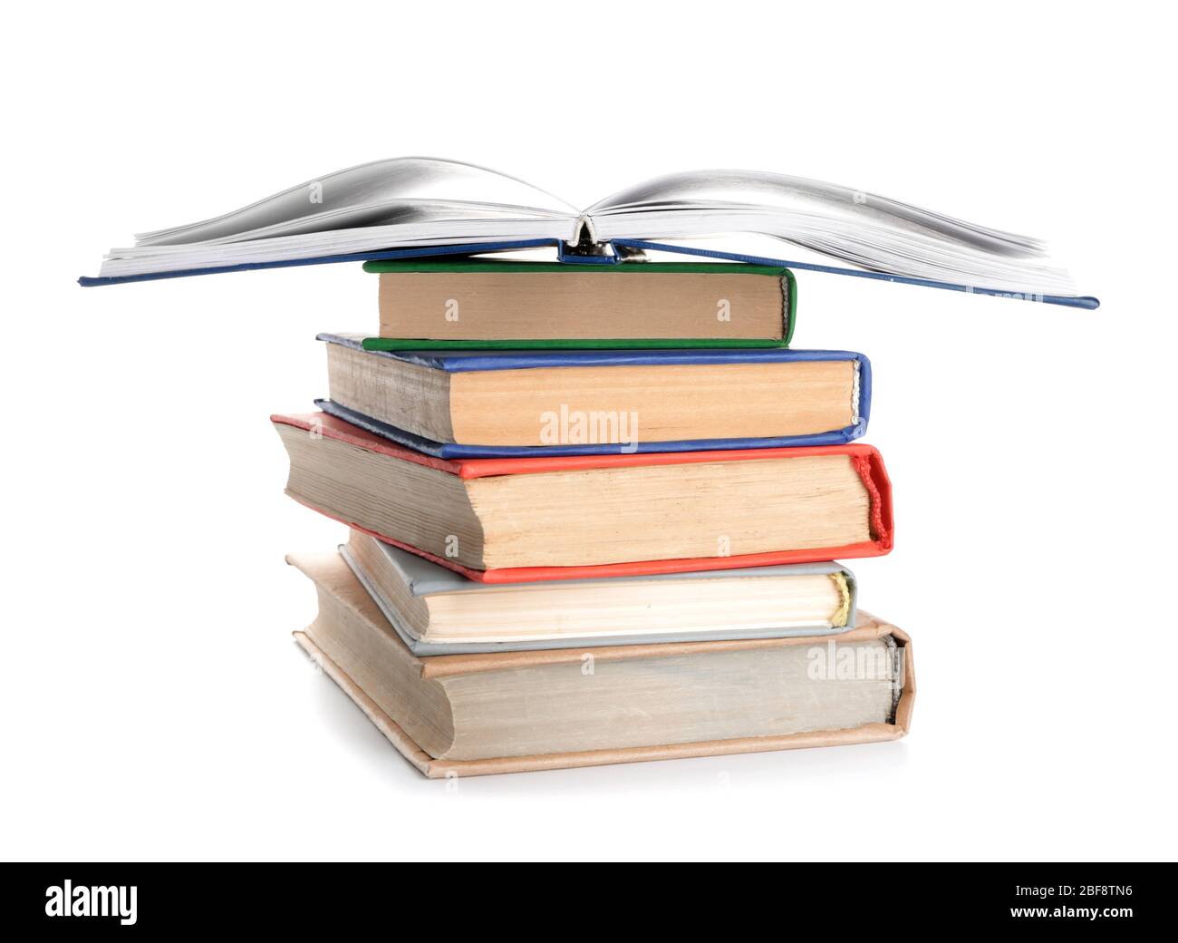 Many books on white background Stock Photo - Alamy