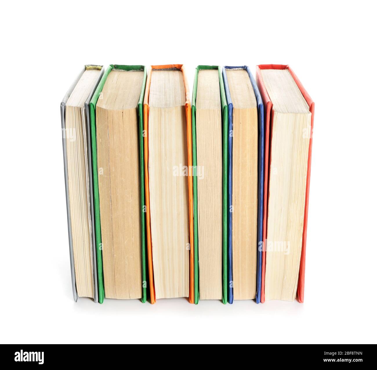 Many books on white background Stock Photo - Alamy