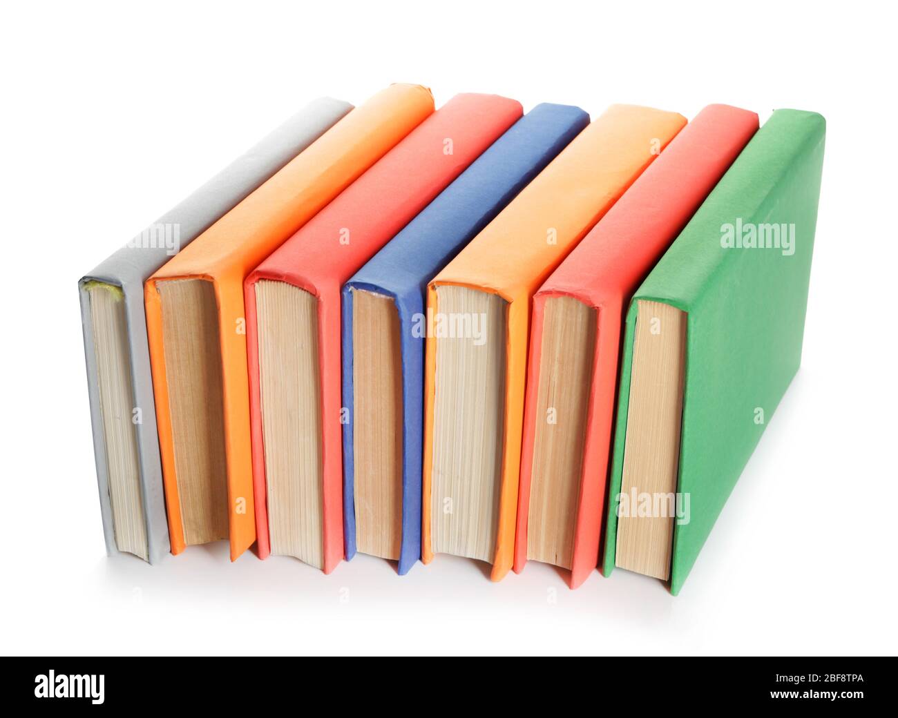 Many books on white background Stock Photo - Alamy