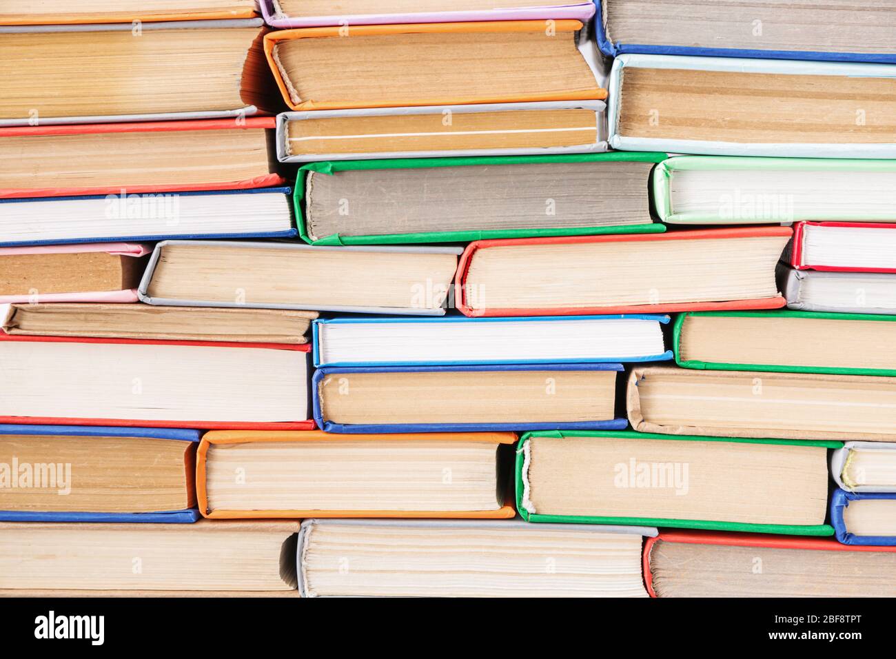 Books background many different books hi-res stock photography and ...