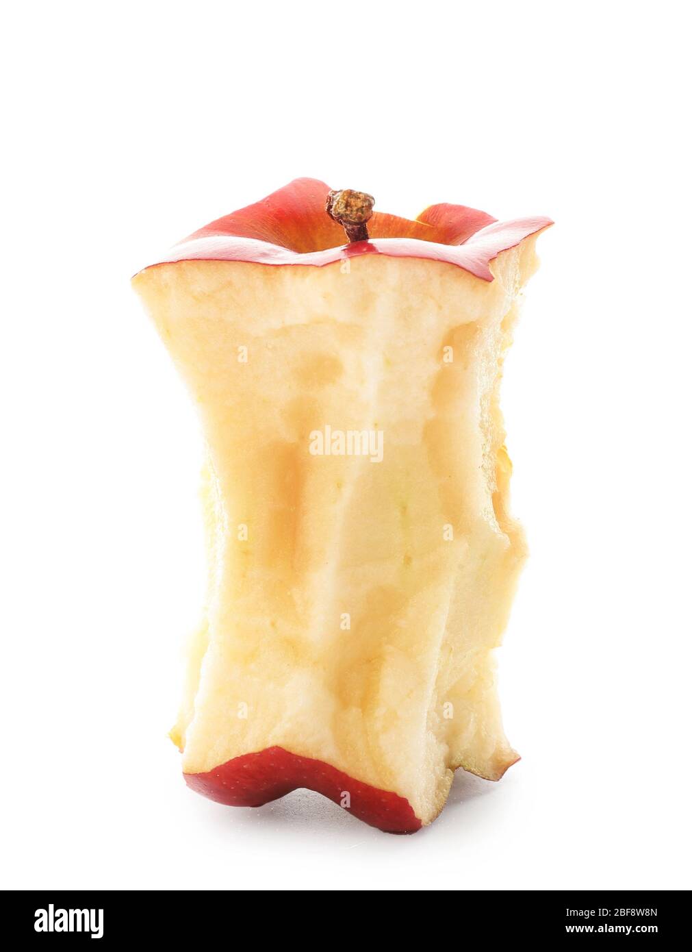 Apple core on white background. Recycling concept Stock Photo - Alamy