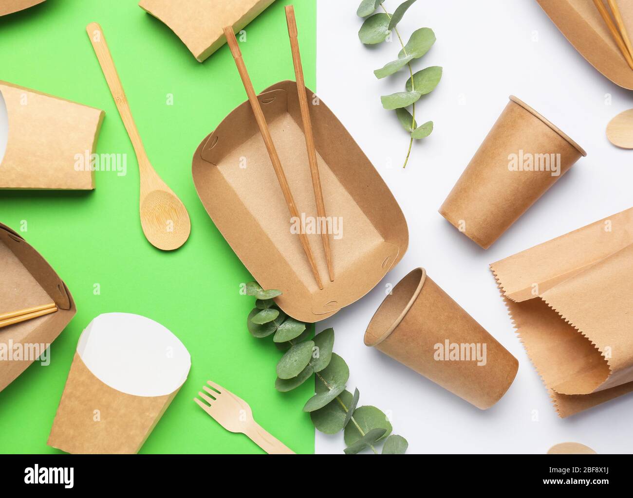 Eco containers for food and drinks on color background Stock Photo - Alamy