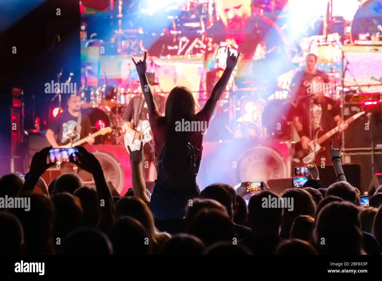 Fans at live rock music concert cheering Stock Photo - Alamy