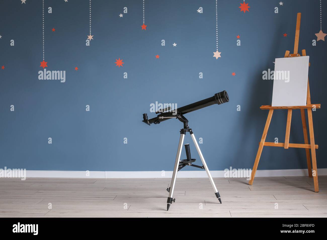 Modern telescope in interior of room Stock Photo - Alamy