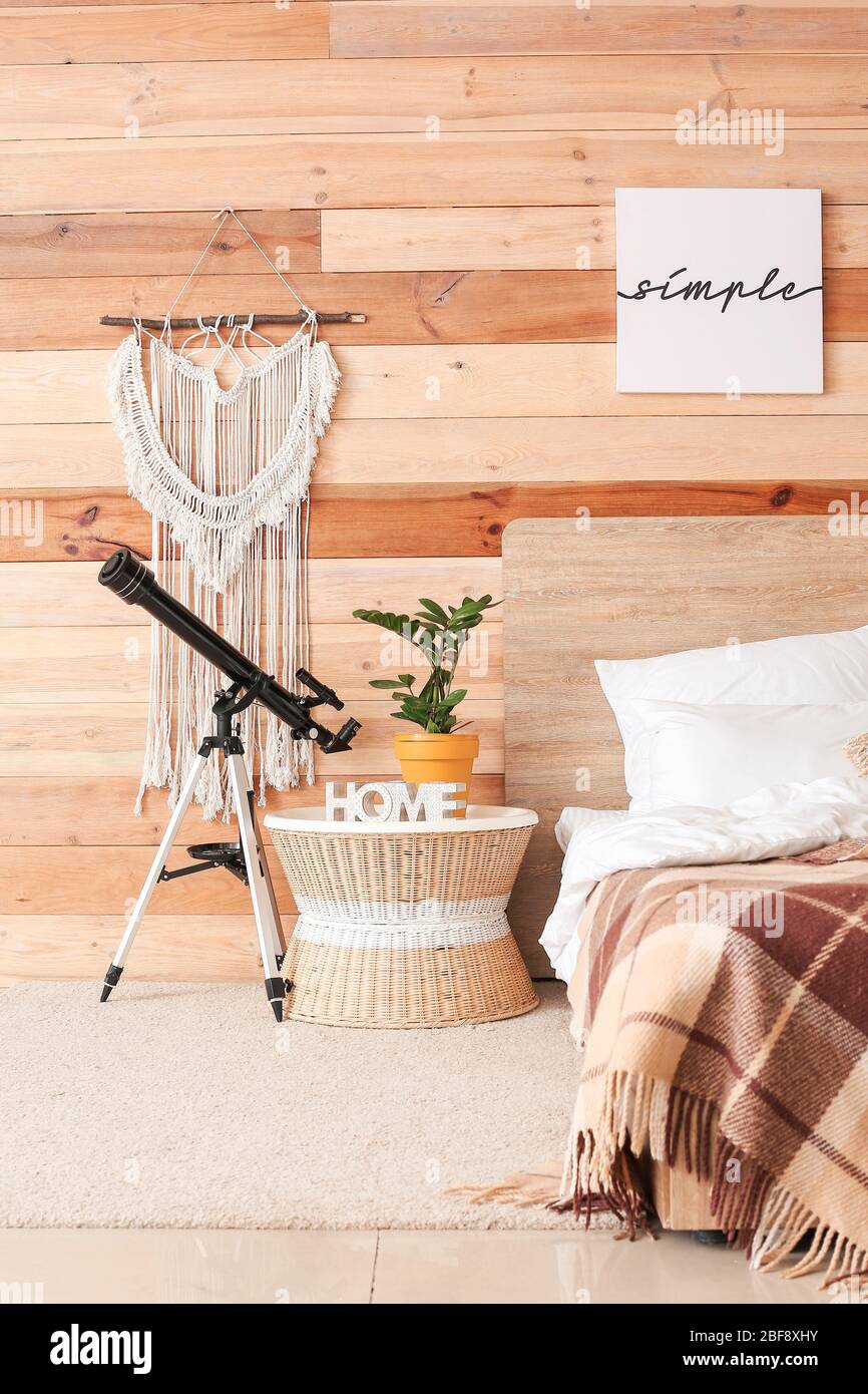 Interior of modern bedroom with telescope Stock Photo - Alamy