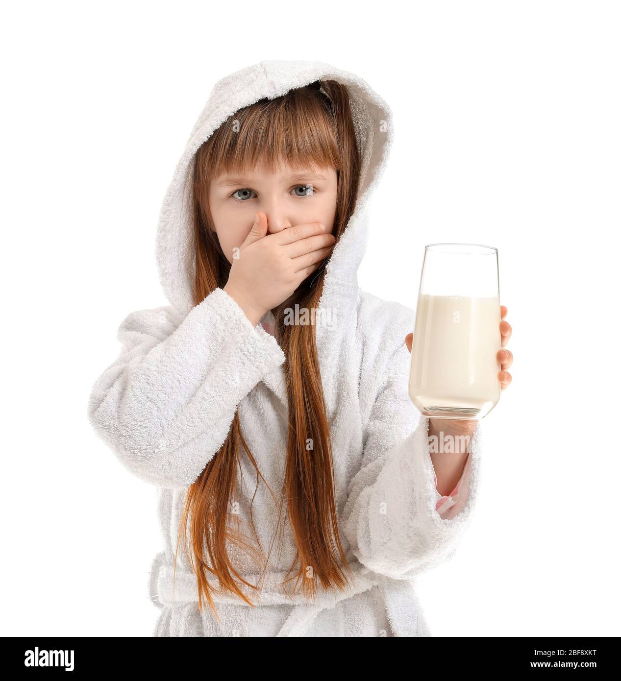 Little girl with milk allergy on white background Stock Photo - Alamy