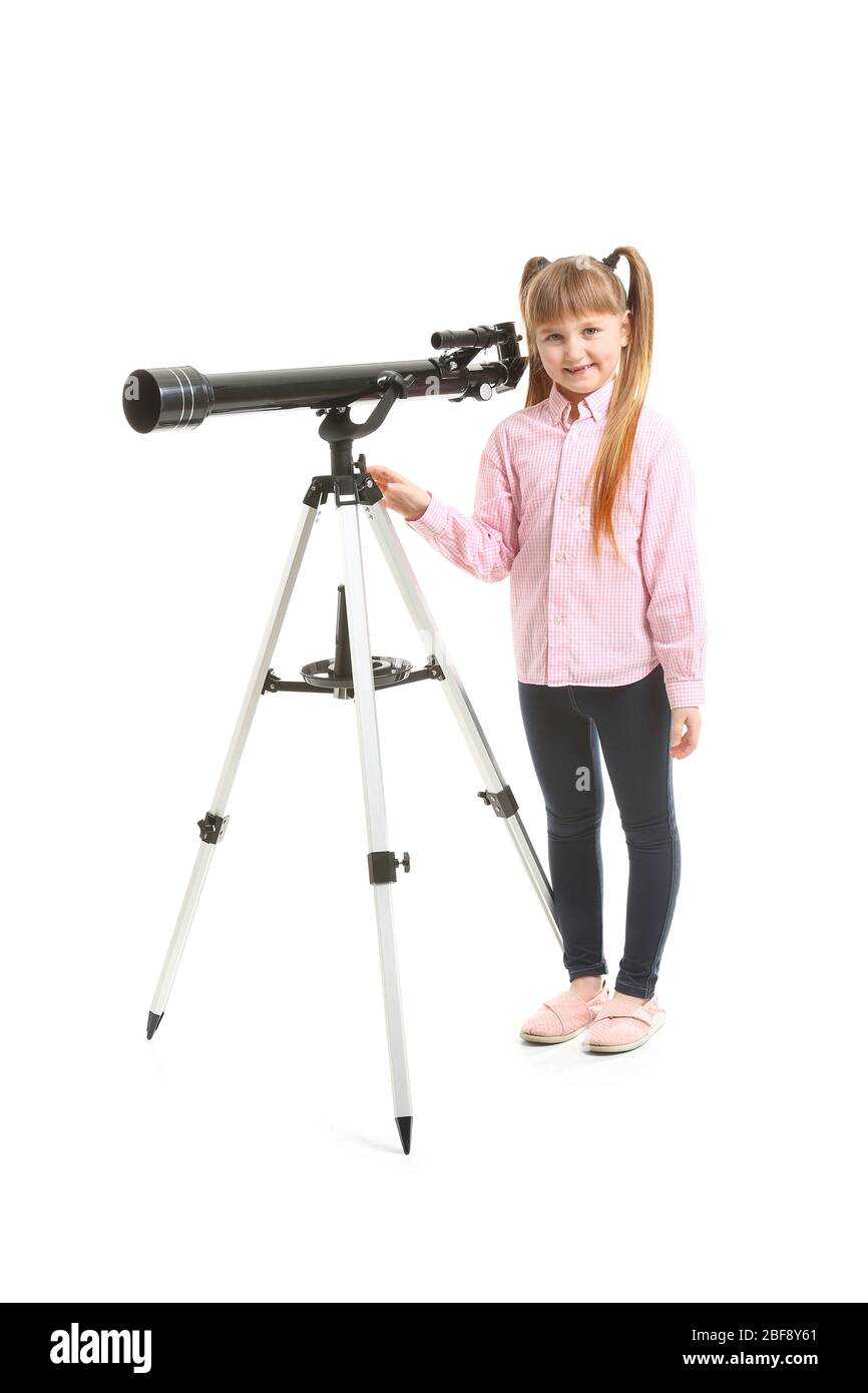 Cute little girl with telescope on white background Stock Photo - Alamy