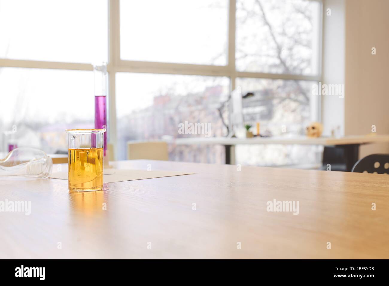 Laboratory glassware on table in classroom Stock Photo - Alamy