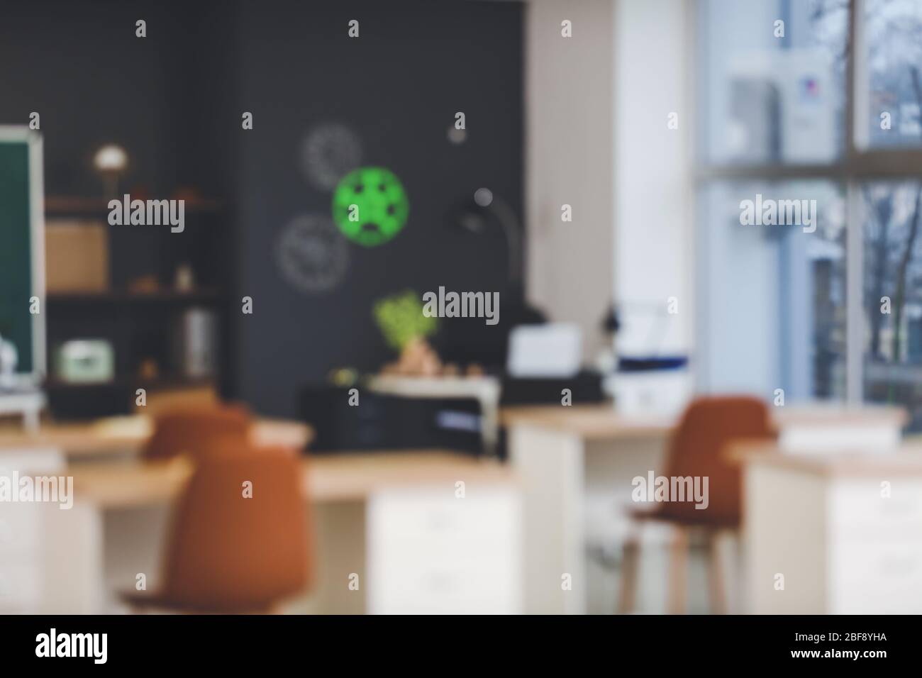 Interior of classroom prepared for lesson, blurred view Stock Photo - Alamy