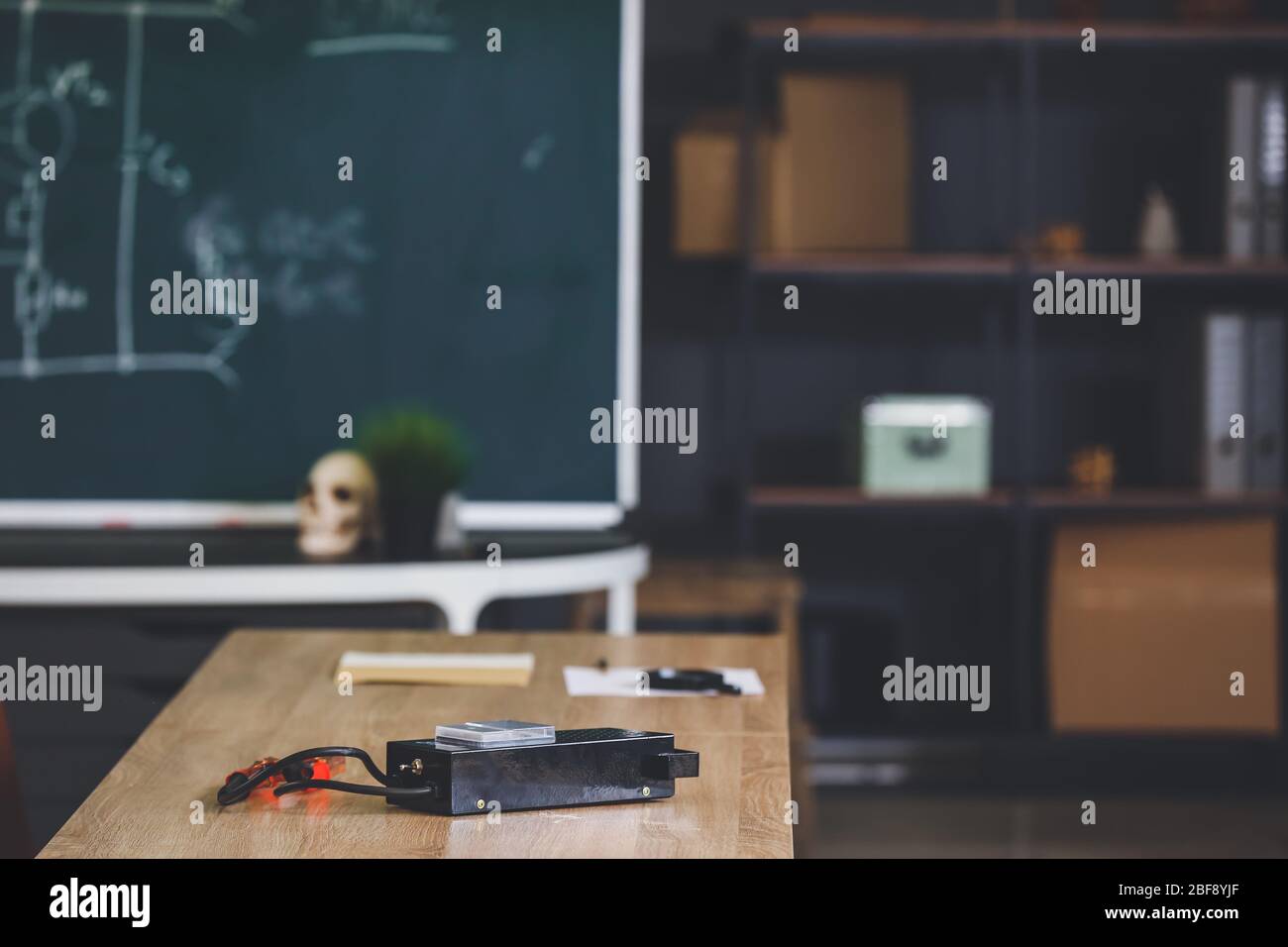 Tester on table in classroom Stock Photo - Alamy