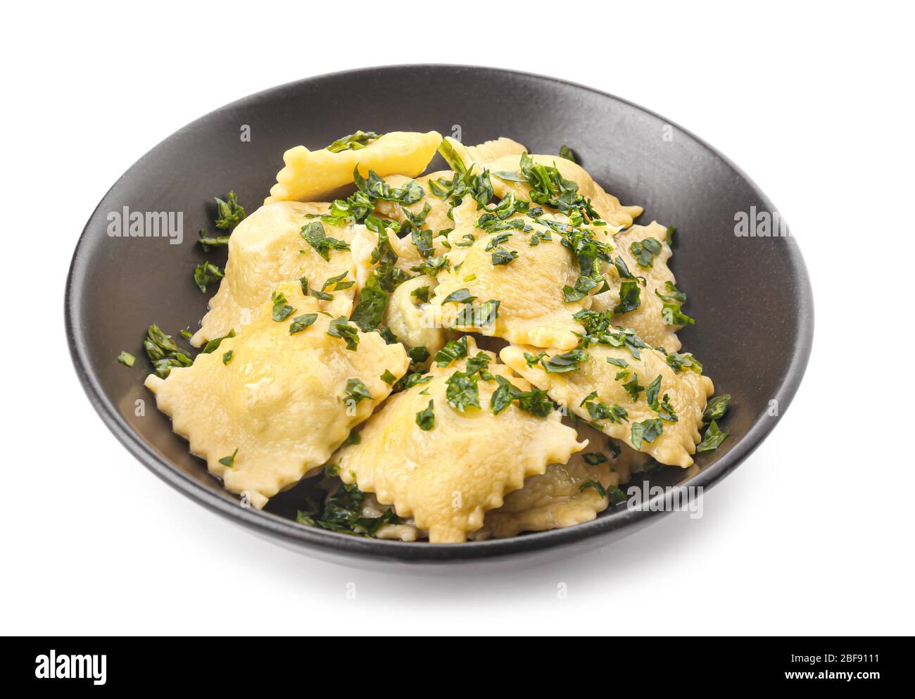 Plate with tasty ravioli on white background Stock Photo - Alamy