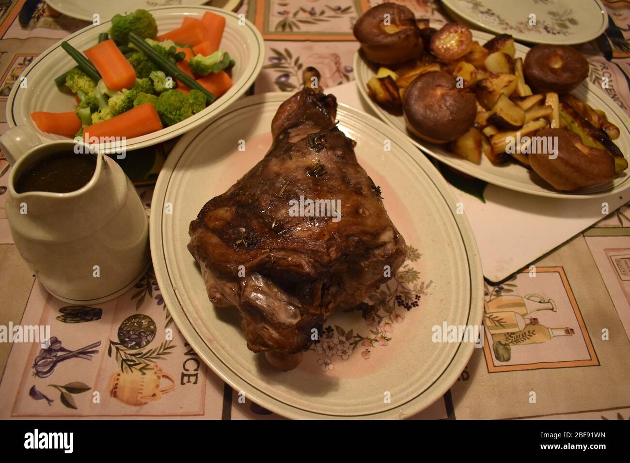 Home cooked traditional Sunday roast non vegetarian dinner Whole lamb ...
