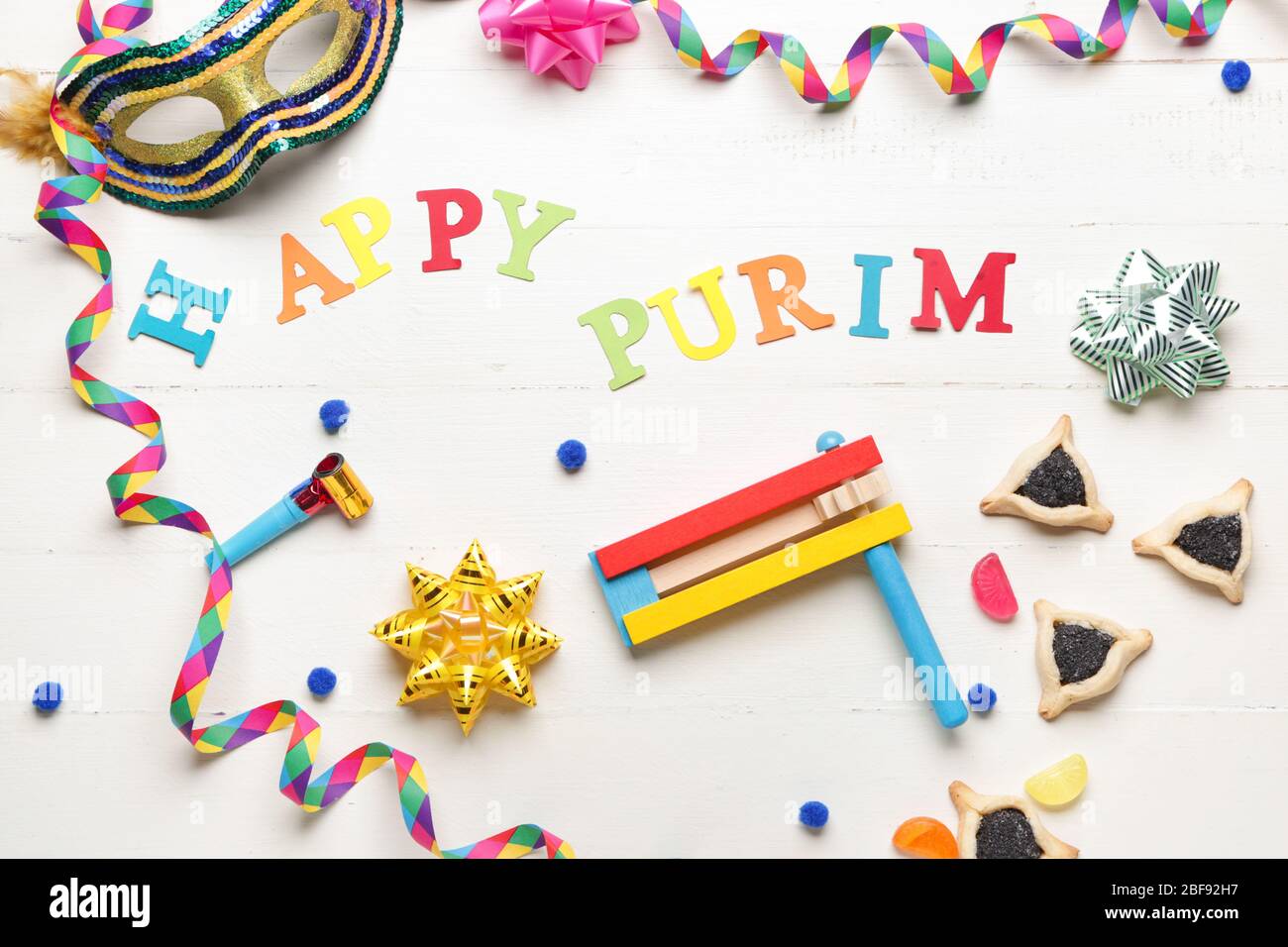 Beautiful composition for Purim holiday on white background Stock Photo ...