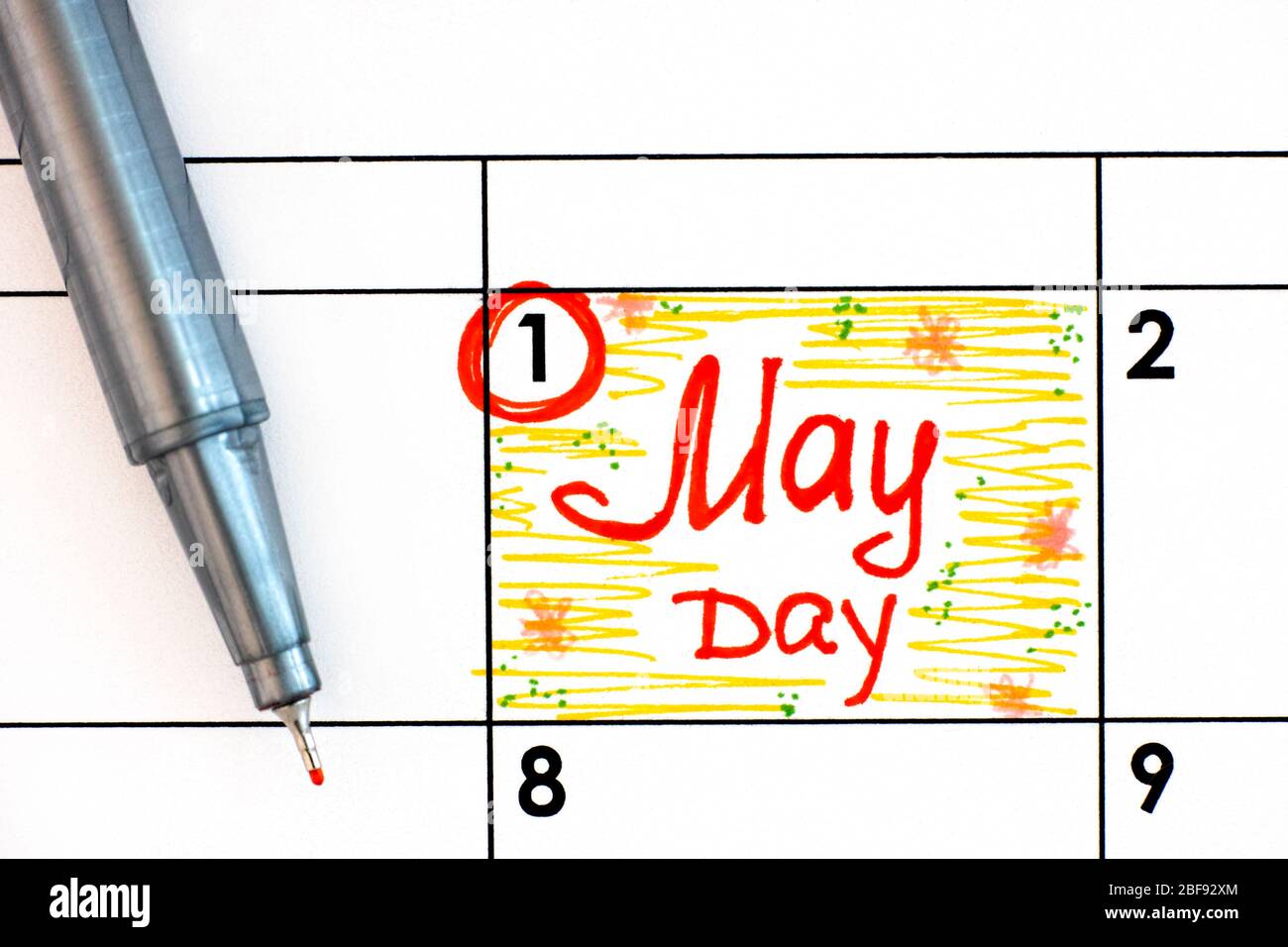 Reminder May Day in calendar with pen. May 01 Stock Photo - Alamy