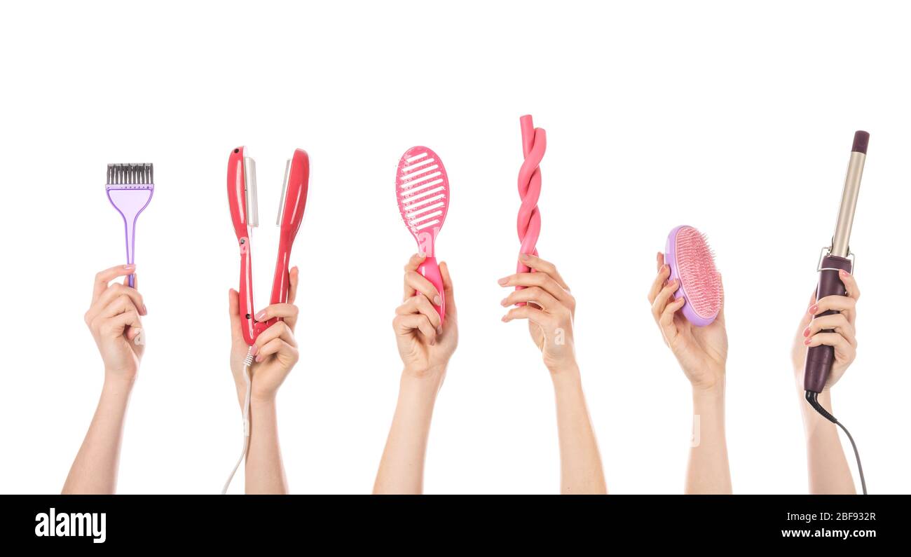 Many hands with hairdresser's supplies on white background Stock Photo ...