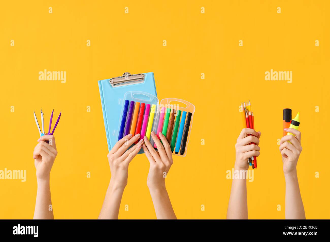 Many hands different school hi-res stock photography and images - Alamy