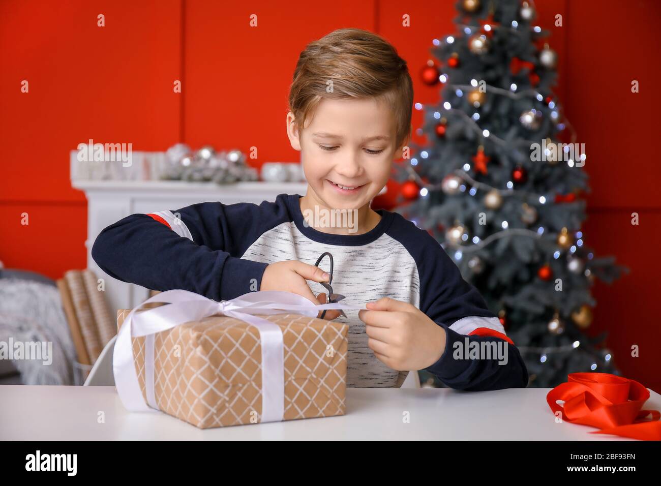 Boy wrapping hi-res stock photography and images - Alamy
