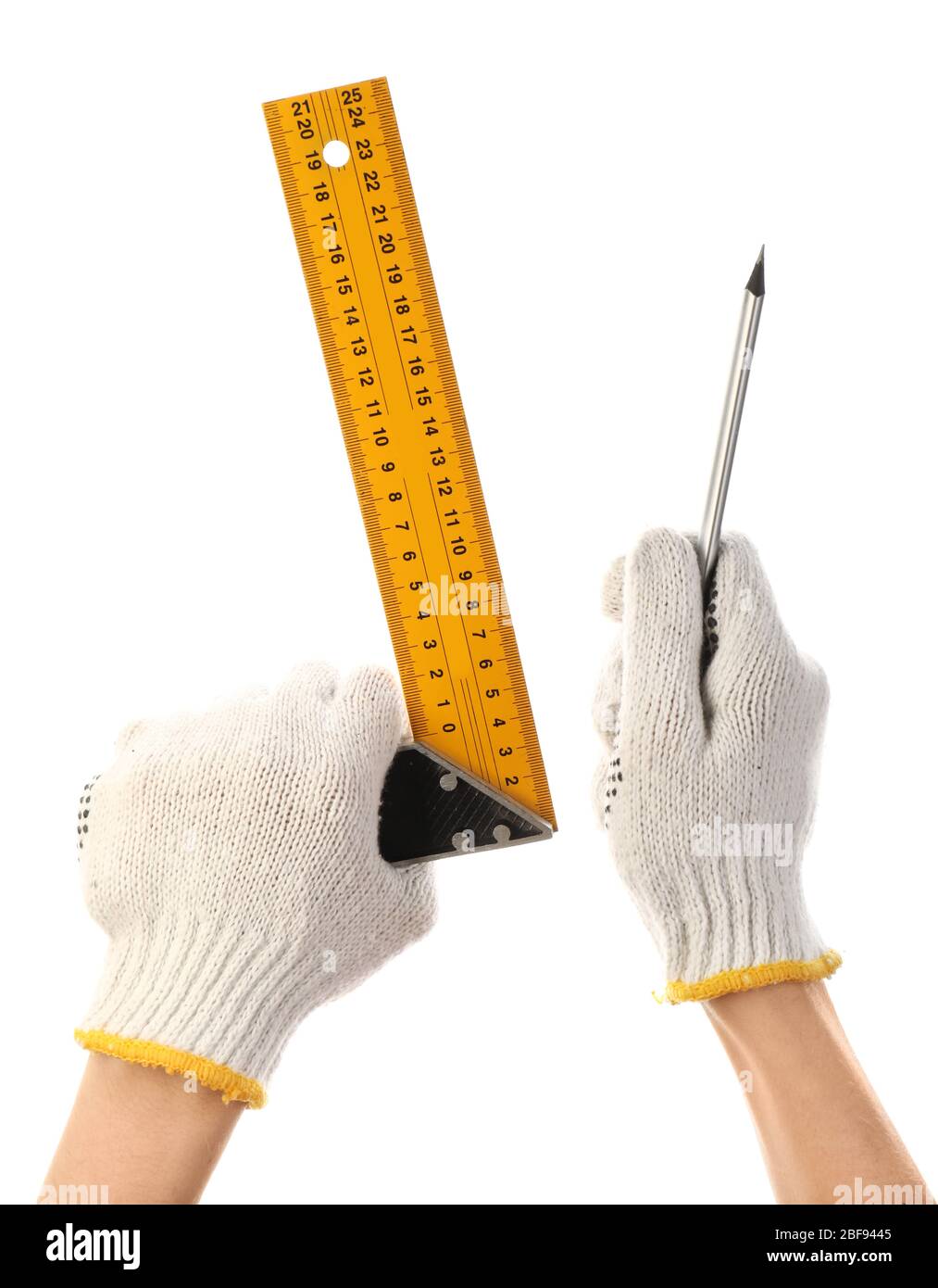 Female hands with builder's ruler and pencil on white background Stock ...