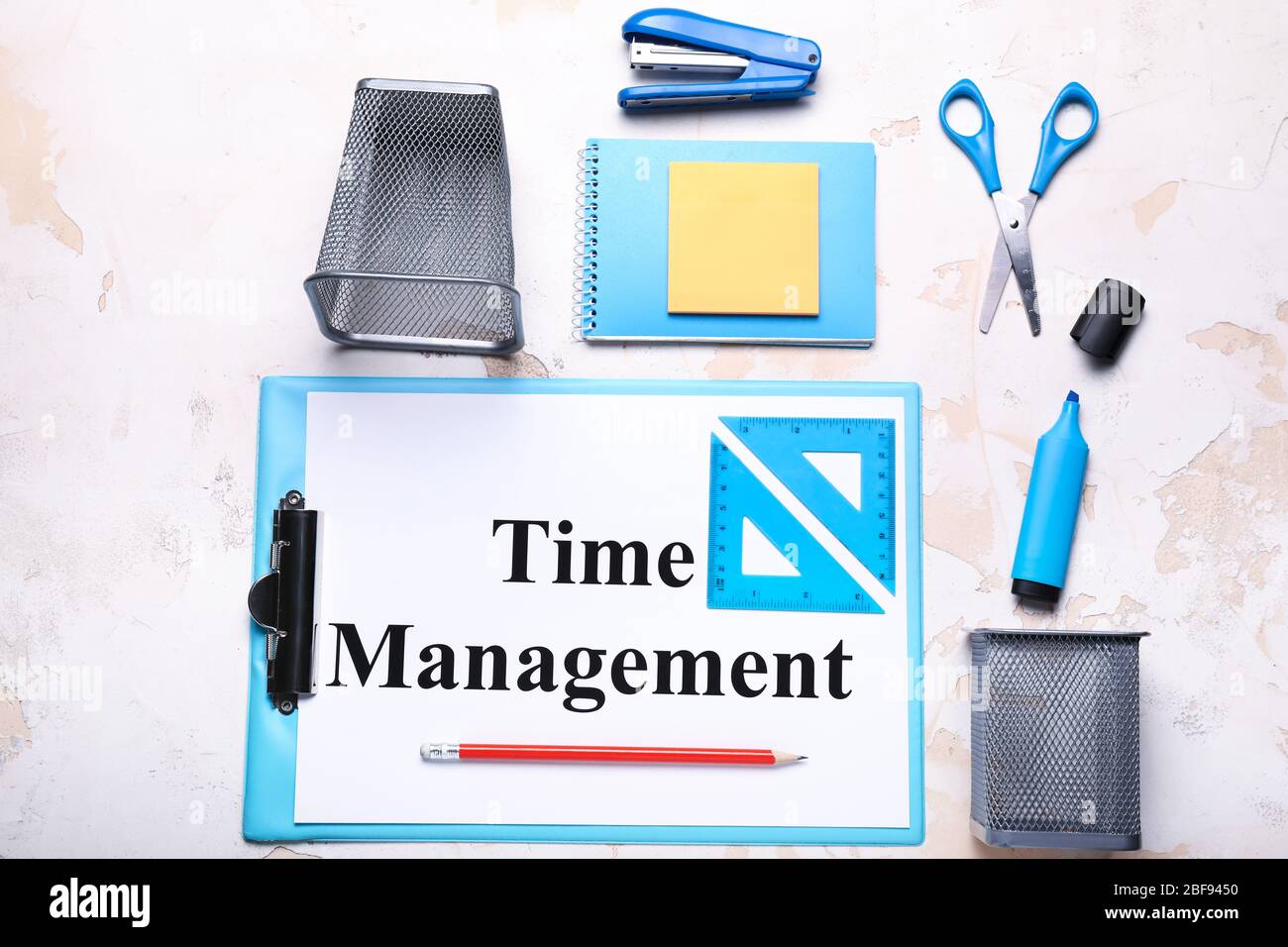 Stationery and text TIME MANAGEMENT on white background Stock Photo - Alamy