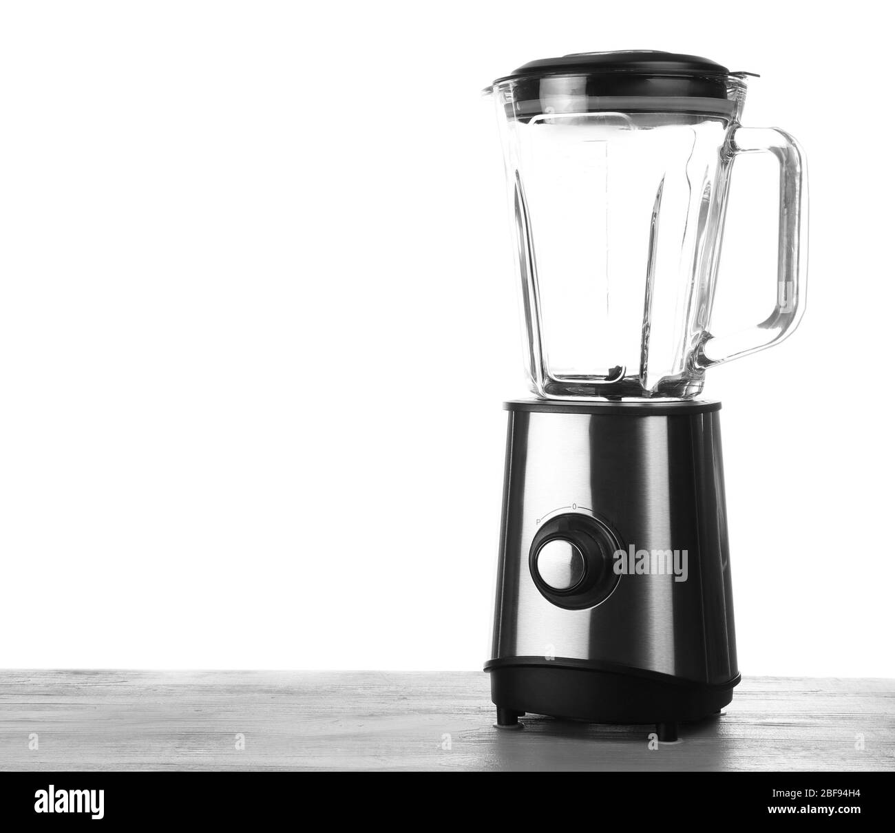 Modern blender on table against white background Stock Photo - Alamy