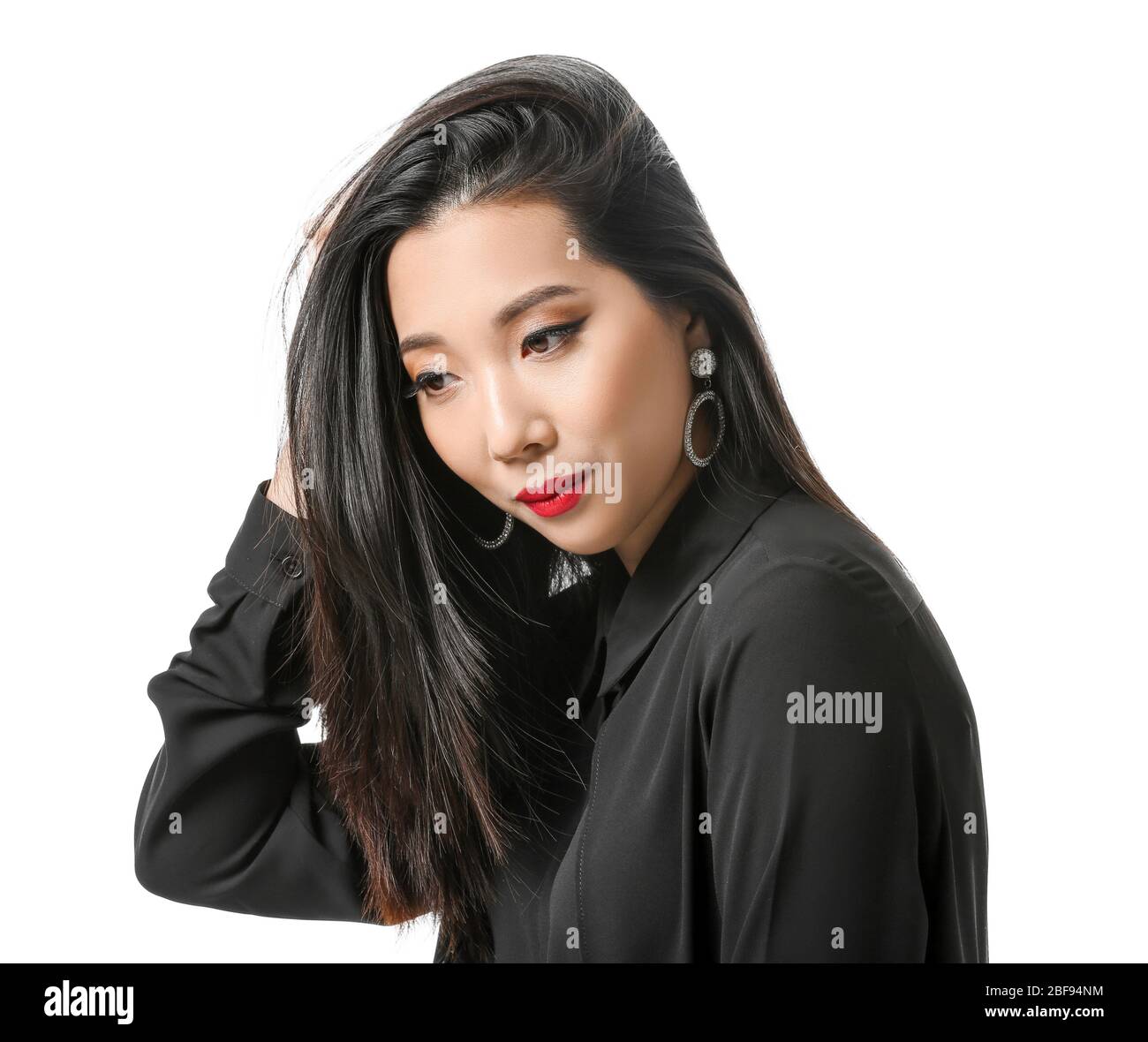Young Asian woman with beautiful hair on white background Stock Photo ...