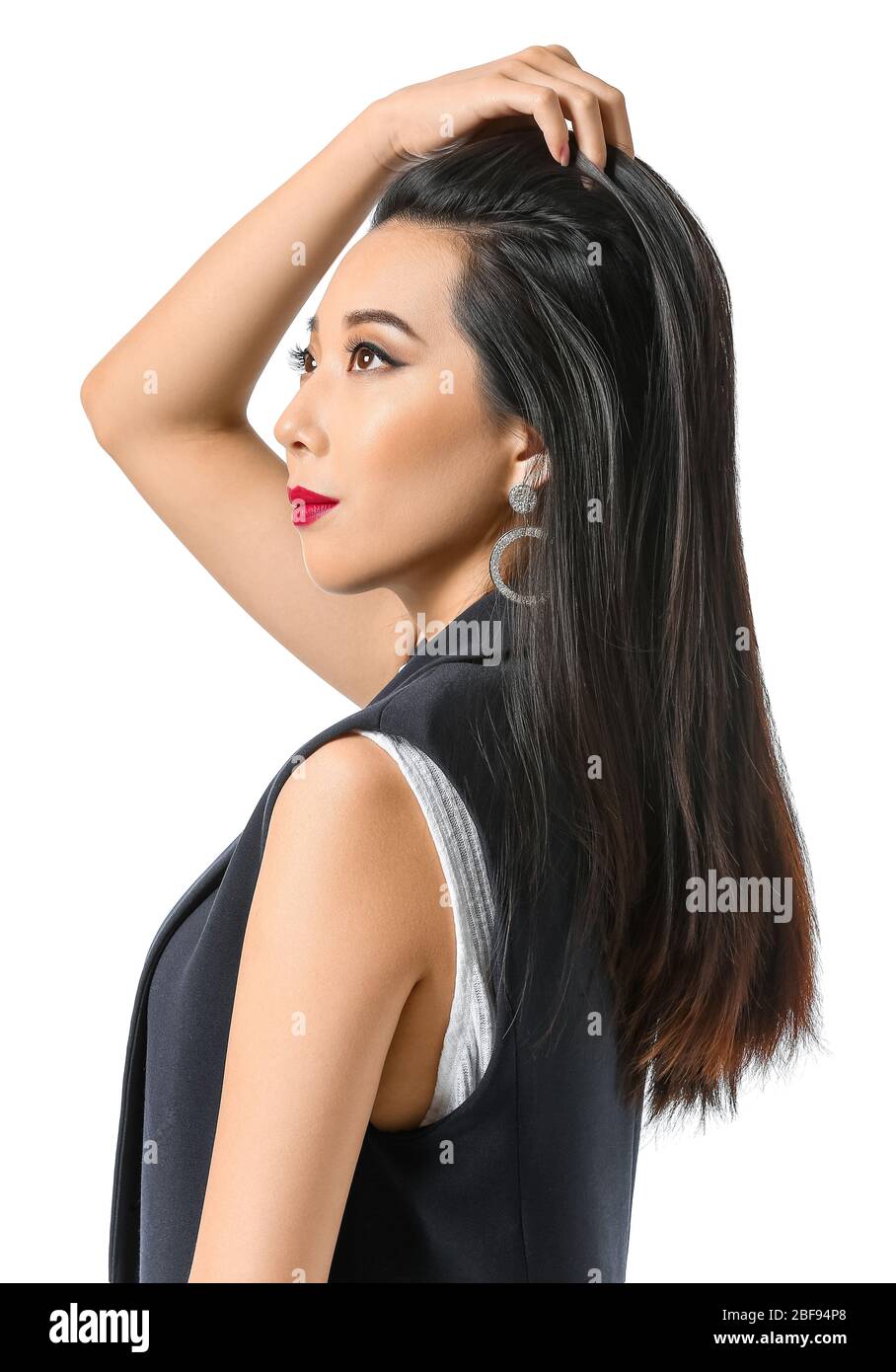 Young Asian woman with beautiful hair on white background Stock Photo ...
